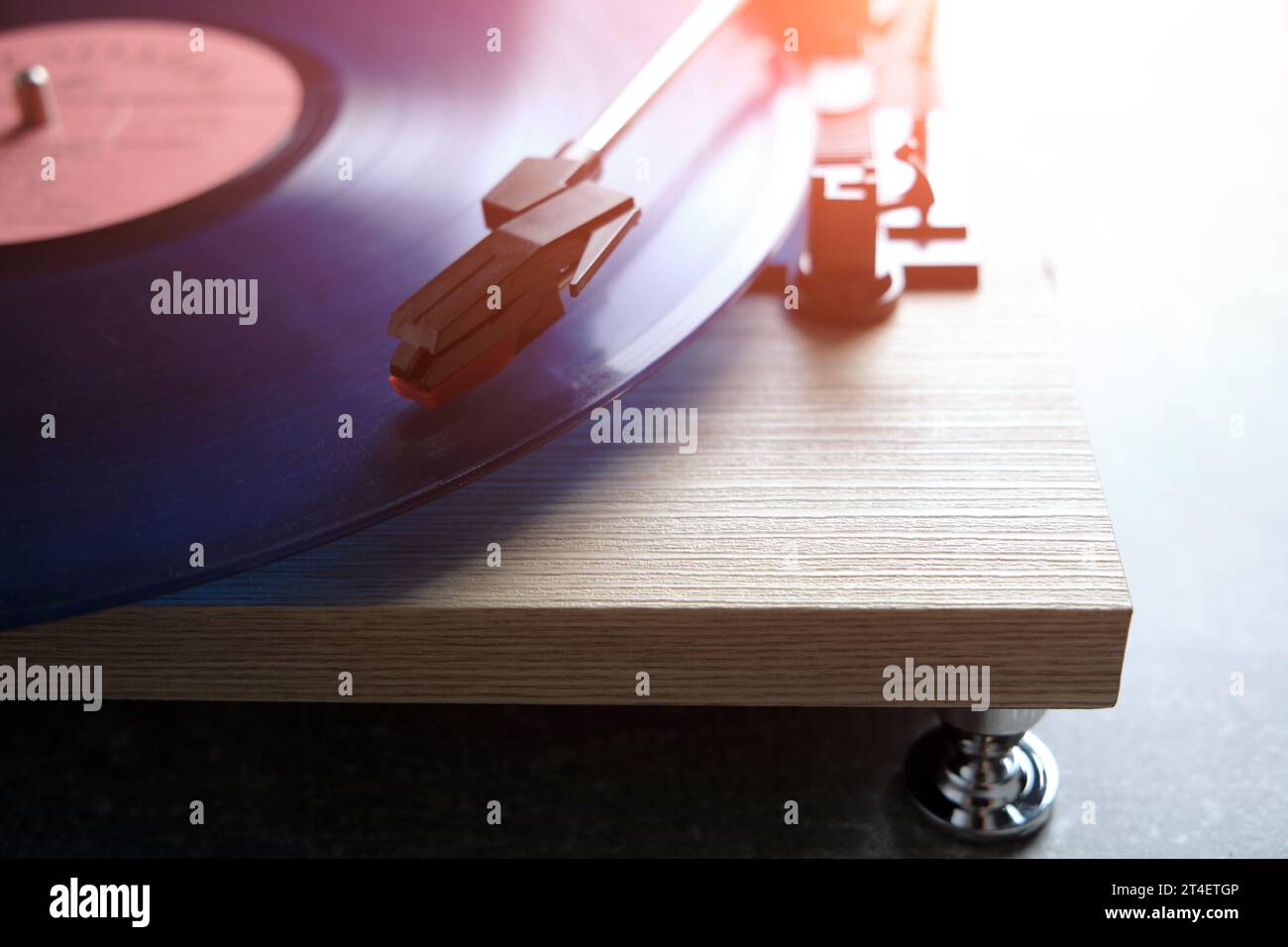 Classic vinyl record player closeup with contoured sunlight Stock Photo ...