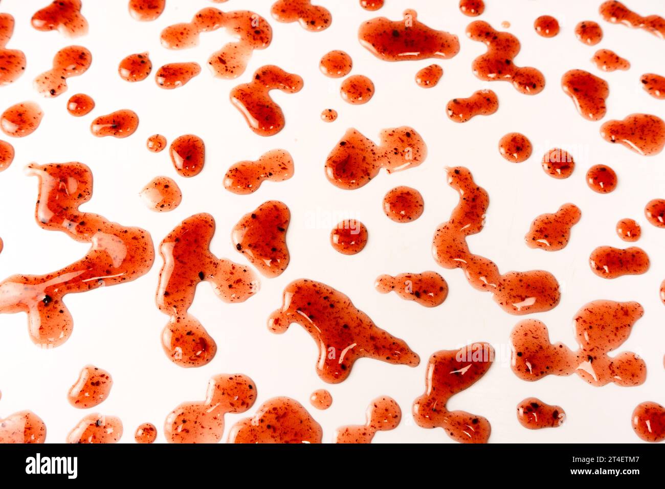 Red jam splashes isolated on a white background. Top view Stock Photo ...