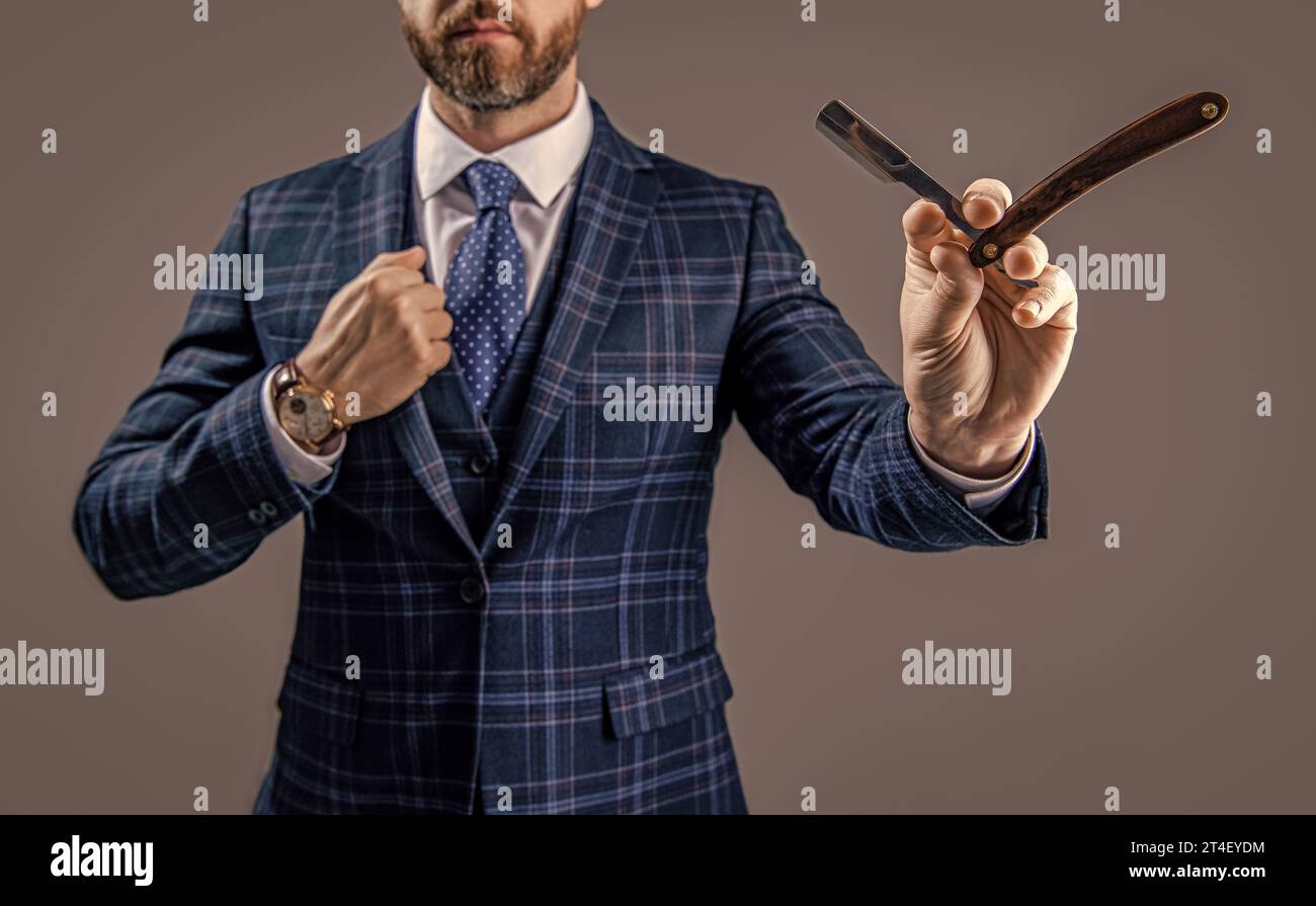 barber man with razor blade, selective focus. man with blade in barber ...