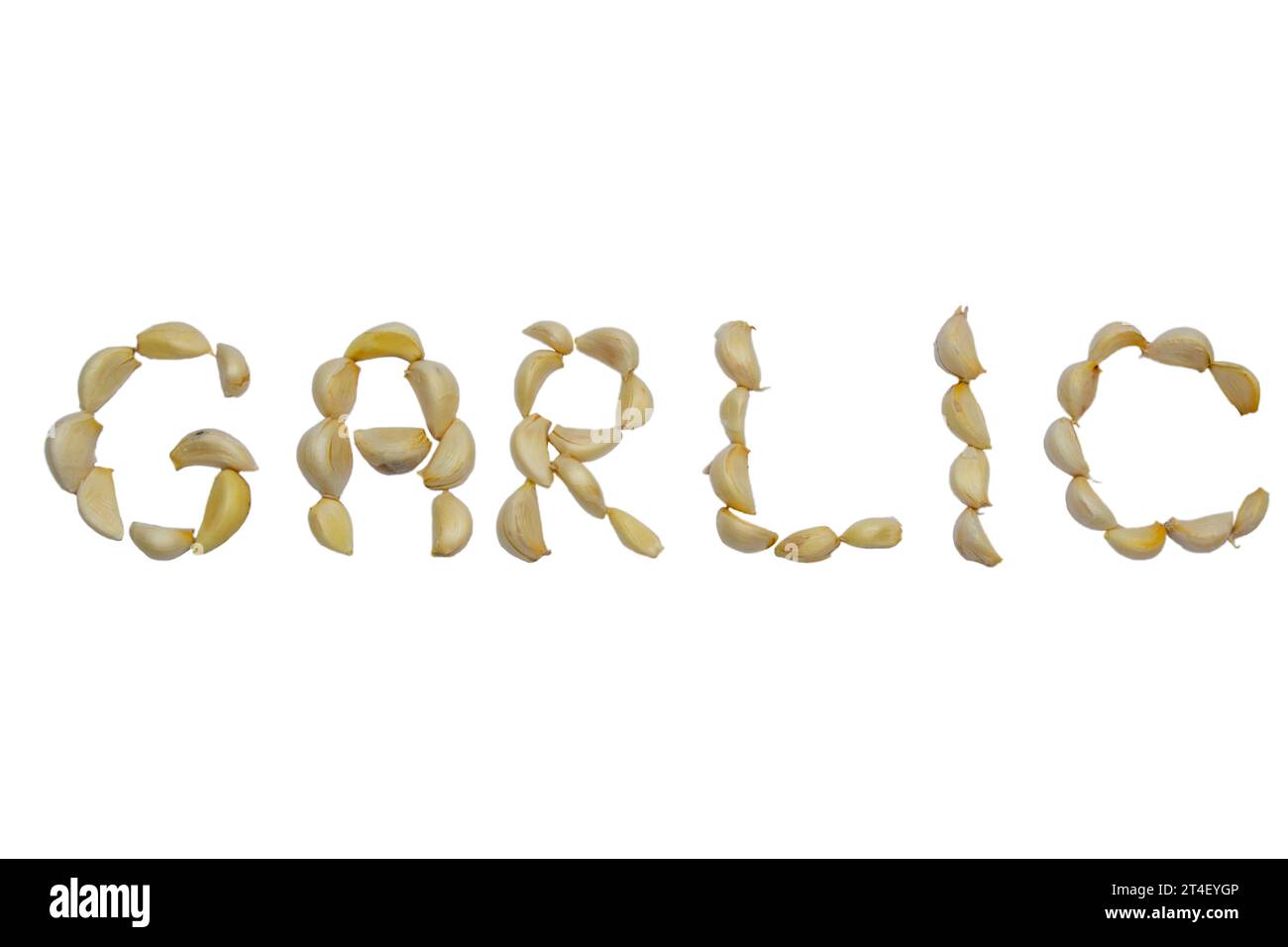 Garlic lettering written with garlic grains on a white isolated ...