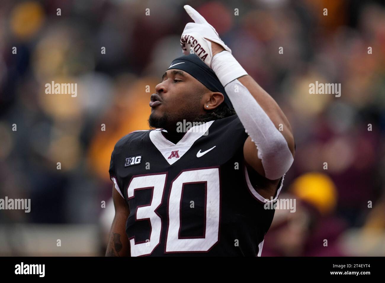 Minnesota running back Jordan Nubin (30) stands on the field before an ...
