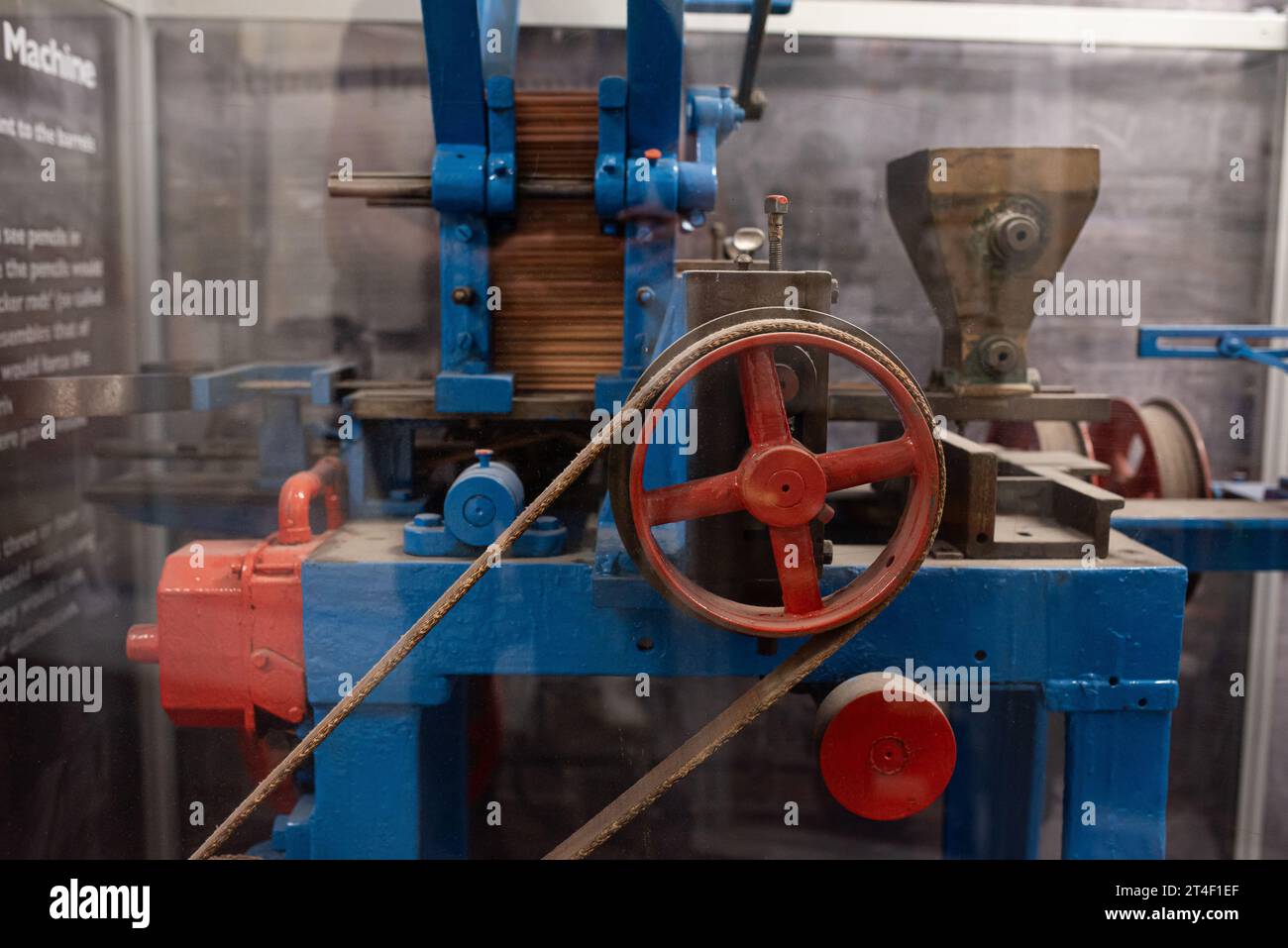 A machine used to fill holes in wood with graphite in the production of ...