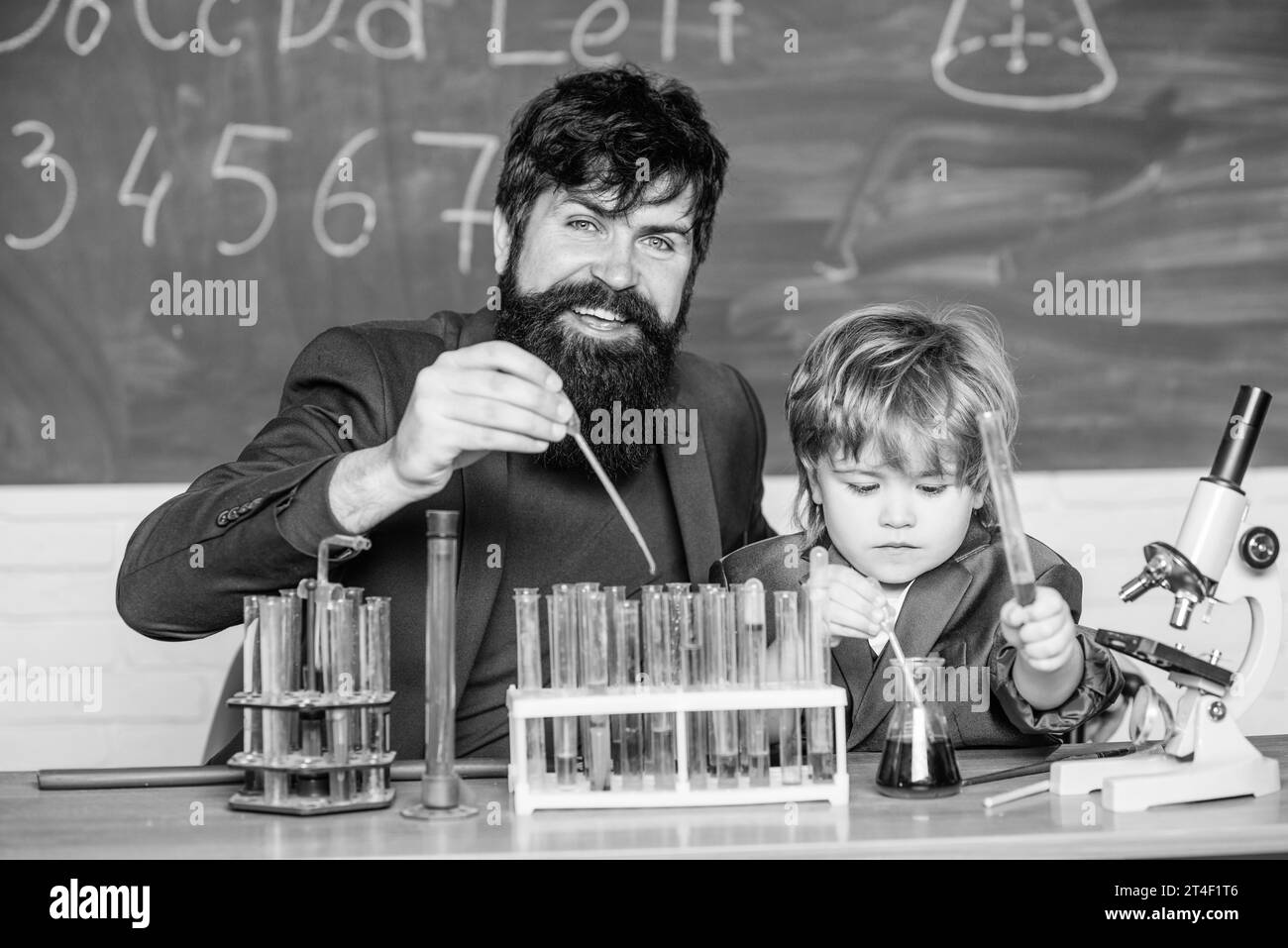 learning chemistry in school laboratory. Back to school. Scientist ...