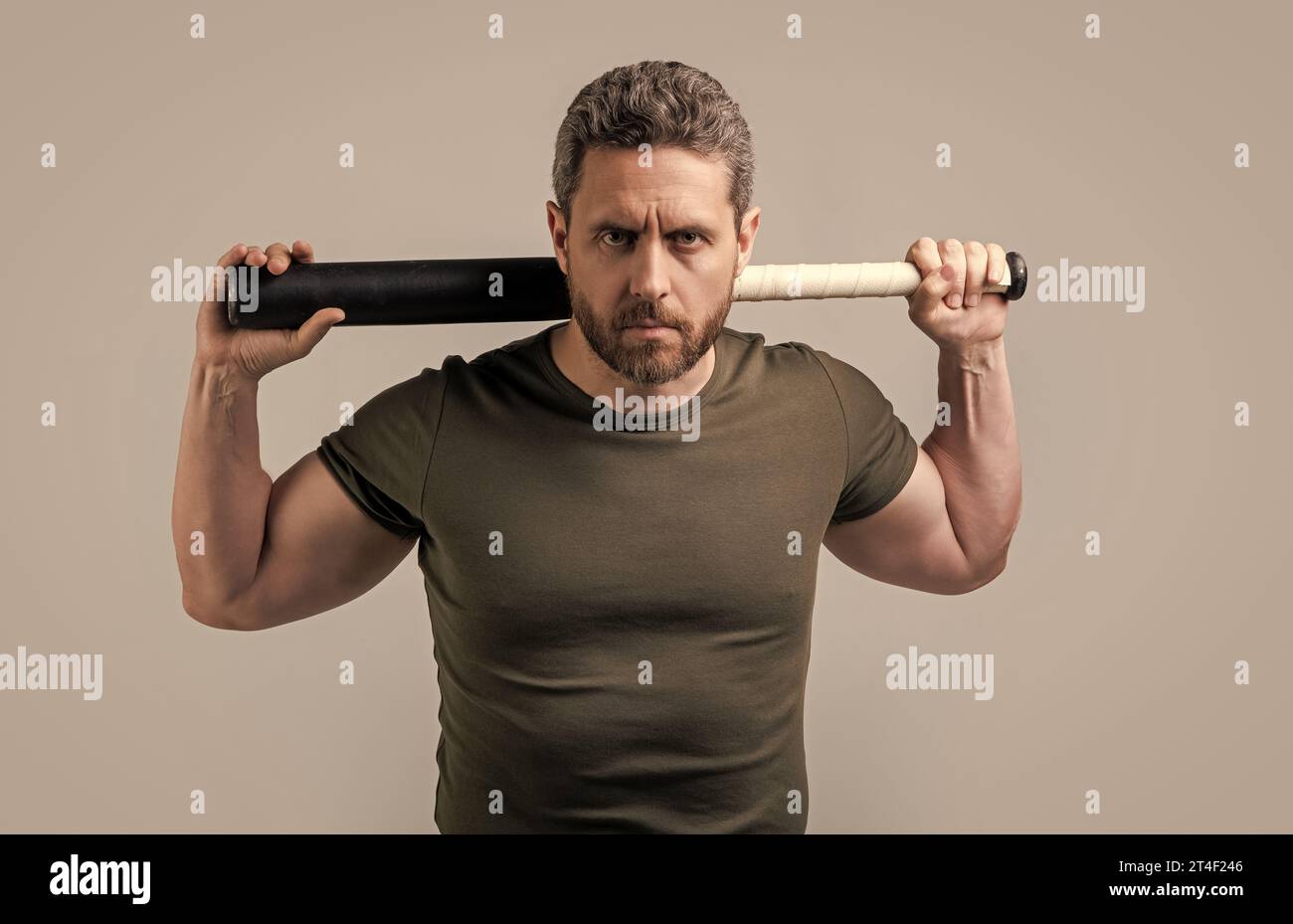 photo of cruel hooligan man with bat. hooligan man threatening with bat ...