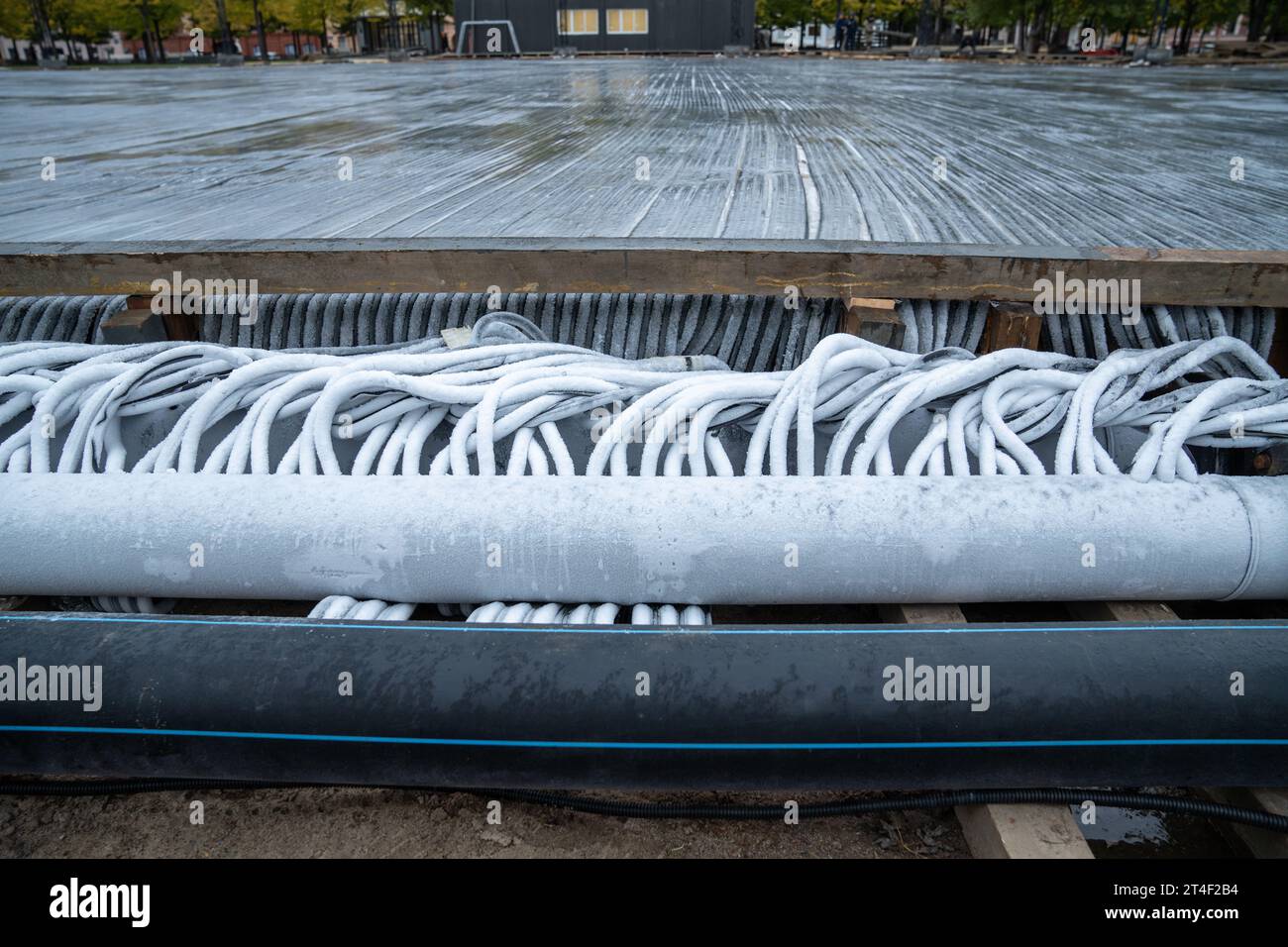 Urban ice rink piping system. Preparation of icy surface for winter ...
