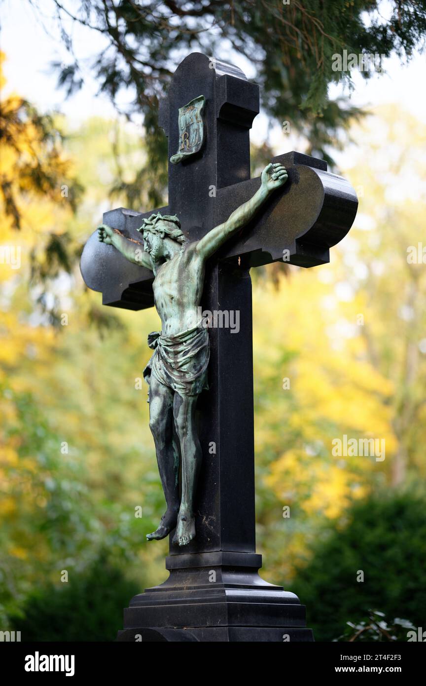 old crucifix in an autumn cemetery in cologne melaten Stock Photo - Alamy