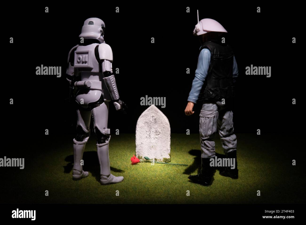 A Stormtrooper and rebel trooper show their respect for the fallen ...