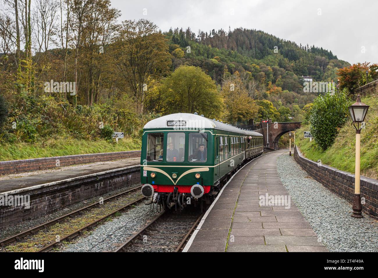 Diesel railcar arrives at Llangollen along the Llangollen Railway in ...