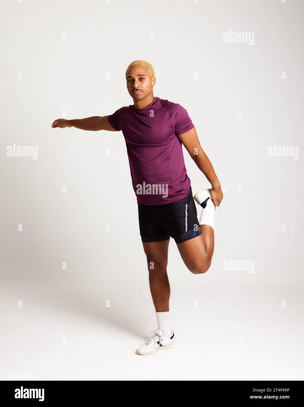 SPORTS MAN STRETCHING HAPPY Stock Photo - Alamy