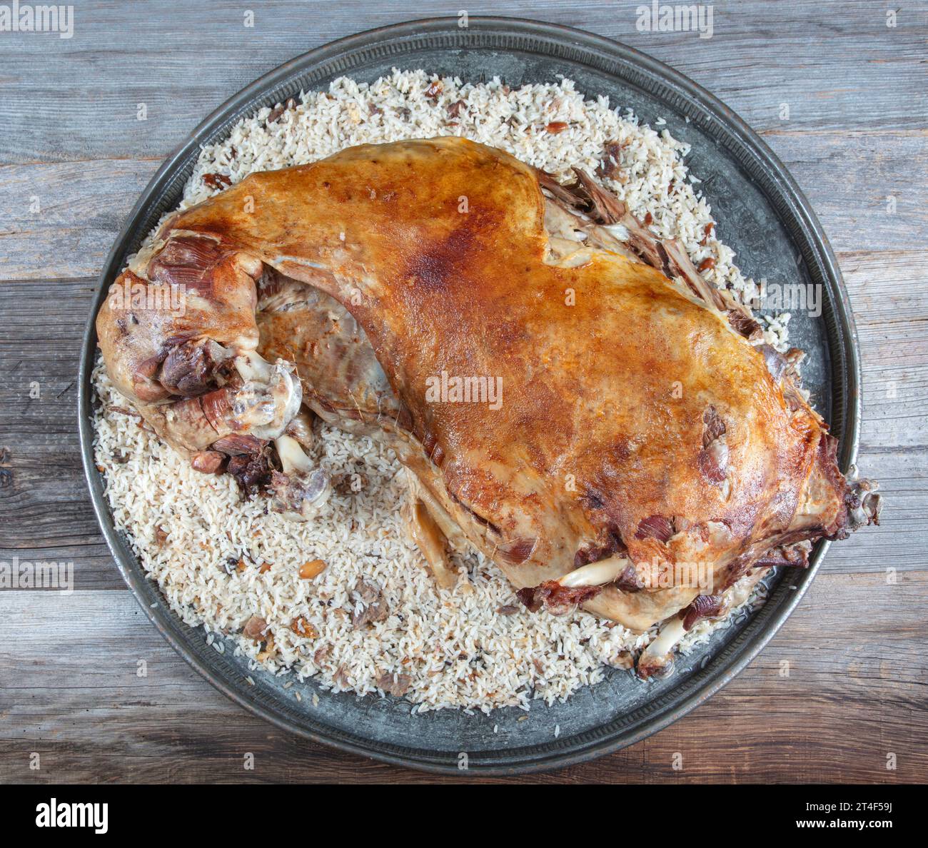 Turkish Cuisine Whole lamb carcass roasted on a spit. Roast whole lamb ...