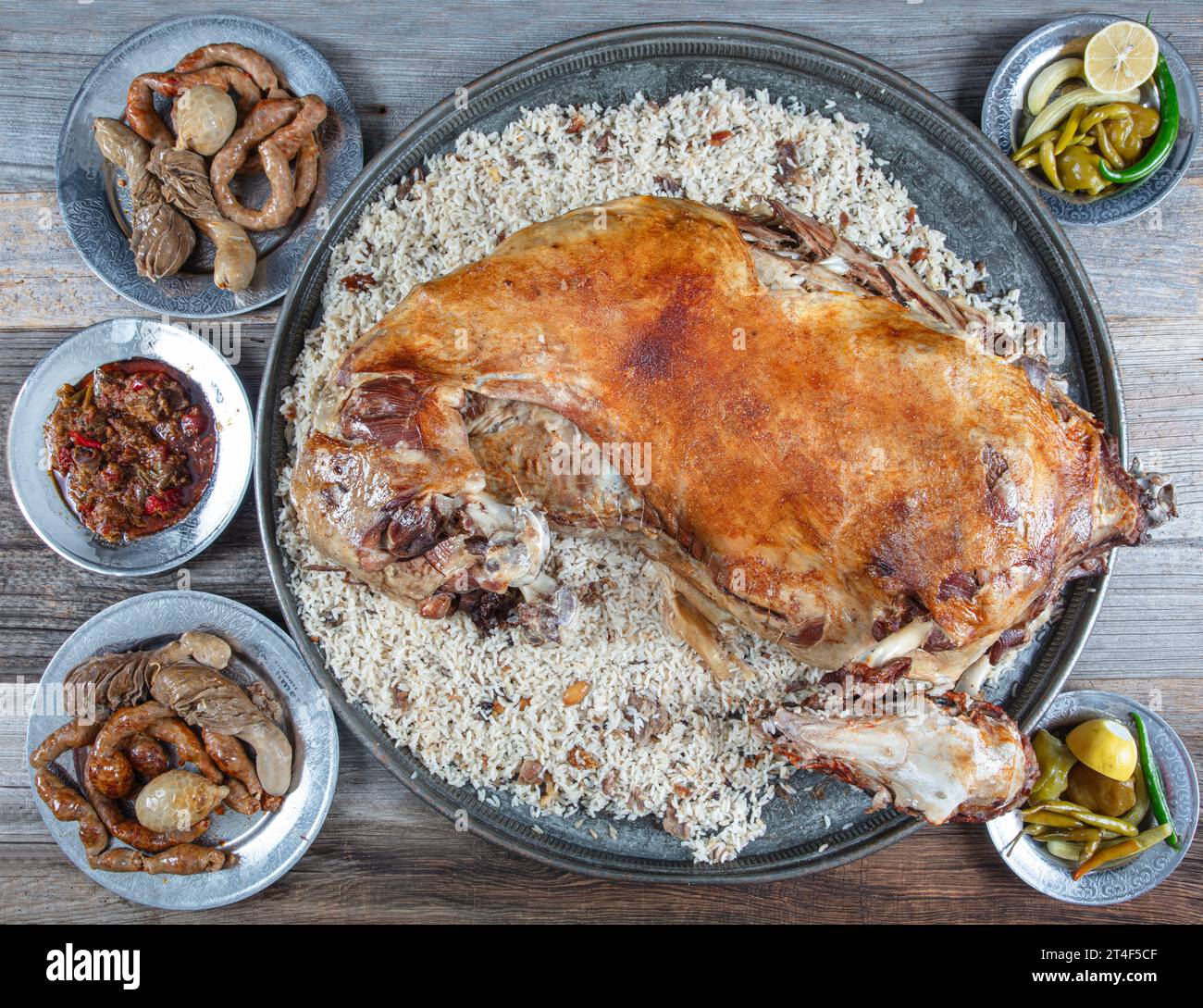 Turkish Cuisine Whole lamb carcass roasted on a spit. Roast whole lamb ...