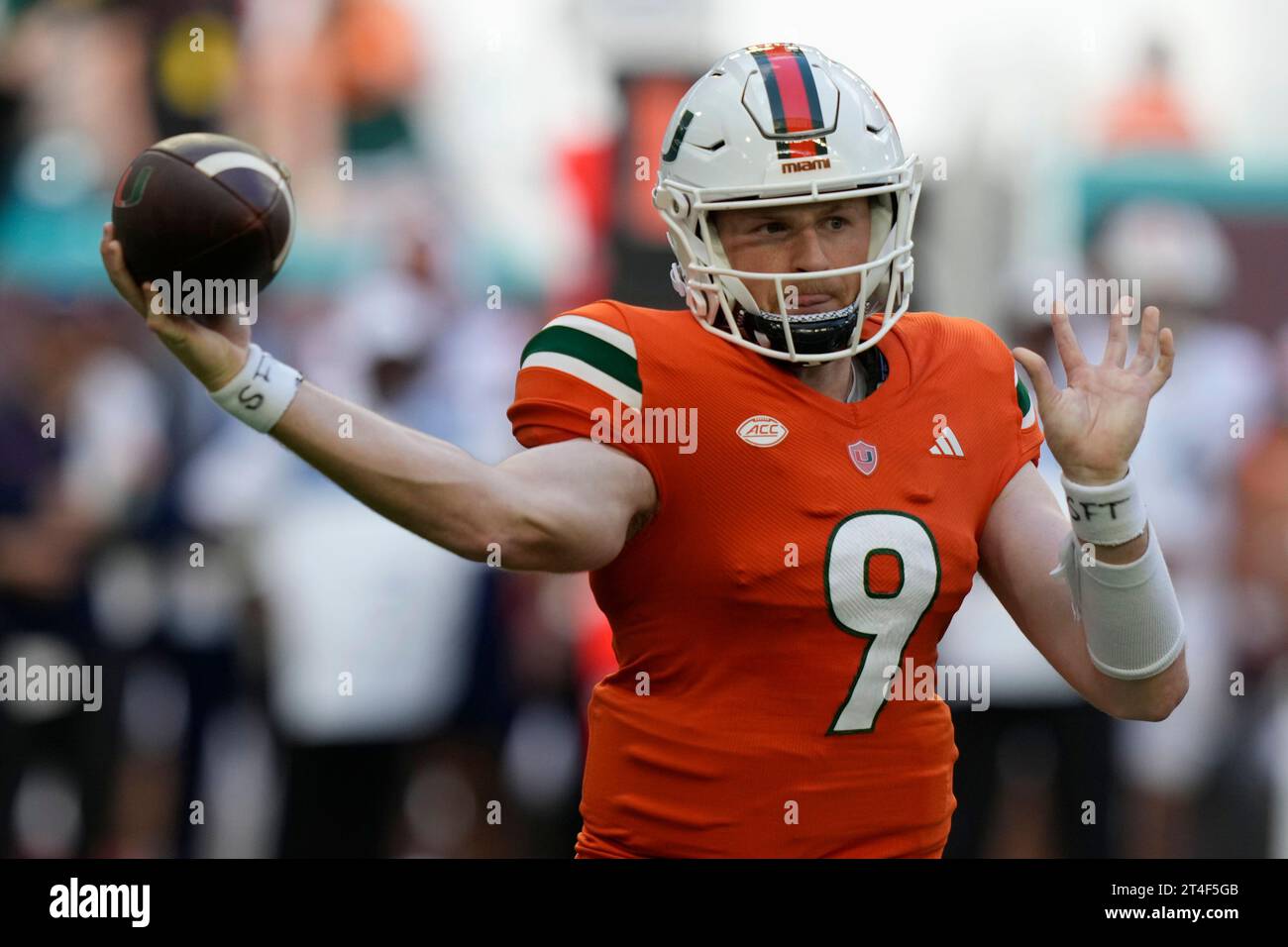 Miami quarterback Tyler Van Dyke (9) throws during the first half of an ...