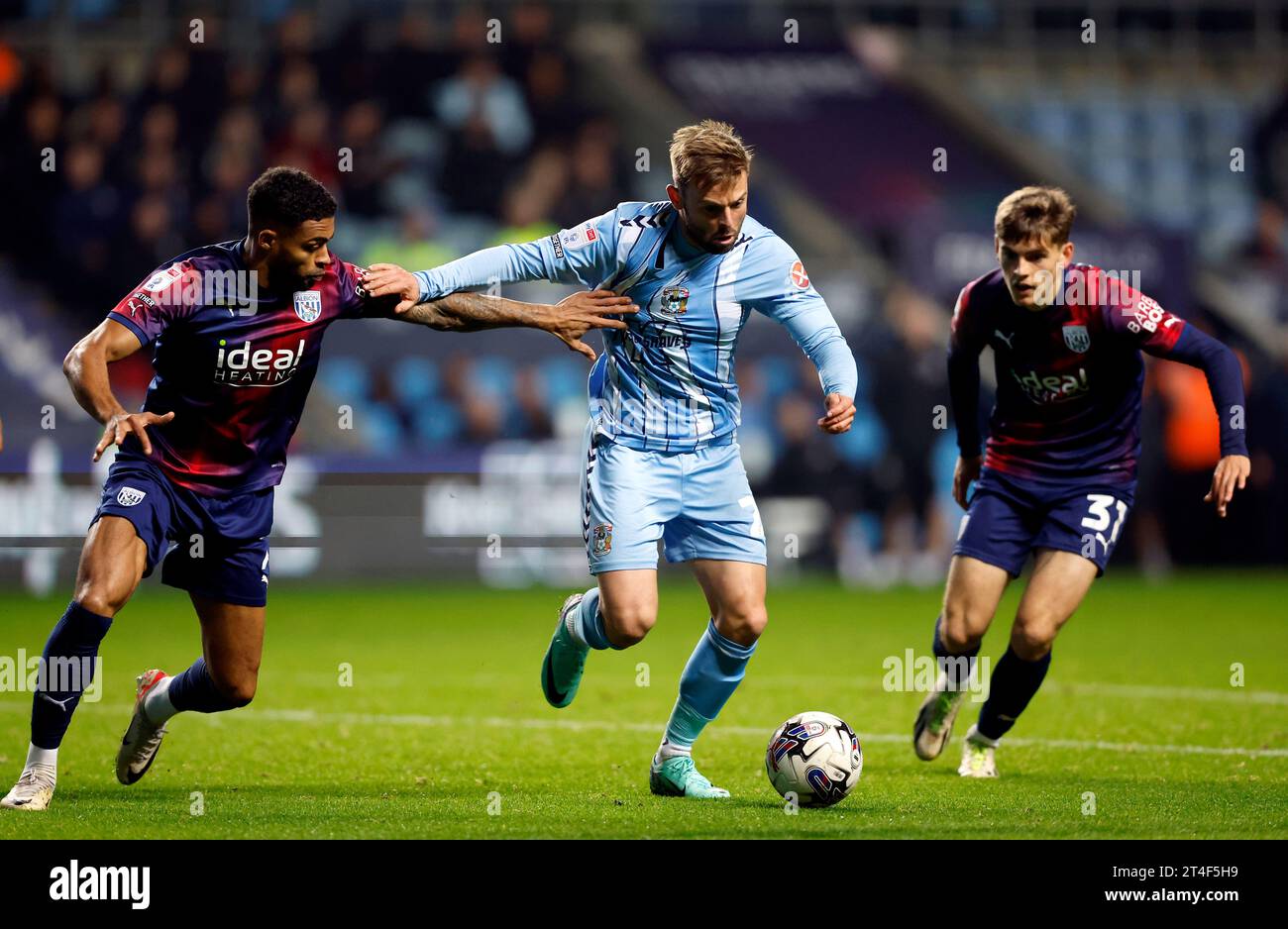 Coventry City's Matthew Godden and West Bromwich Albion's Darnell ...
