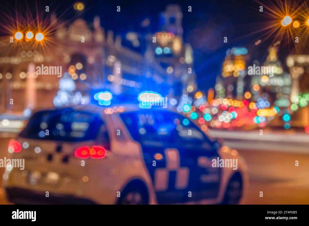 Out of focus view of a police car with sirens on, at night Stock Photo ...