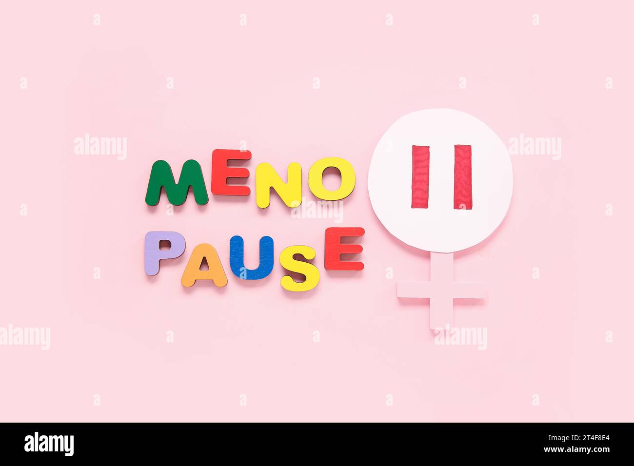 Word MENOPAUSE with symbol of woman on pink background Stock Photo - Alamy