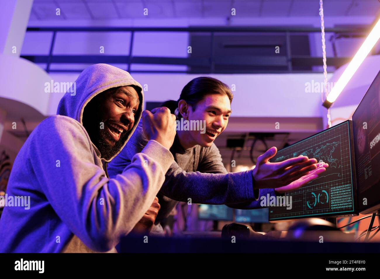 Excited Criminals Hacking Online Server Database Successfully And Celebrating With Victory 
