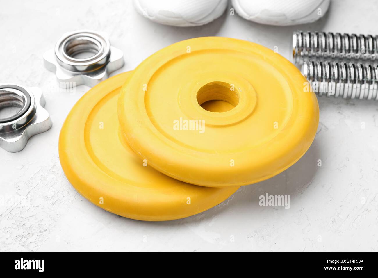 Barbell plates on white background Stock Photo - Alamy