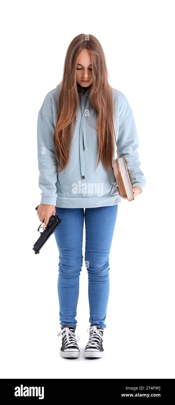 Female student with gun on white background. School shooting concept ...