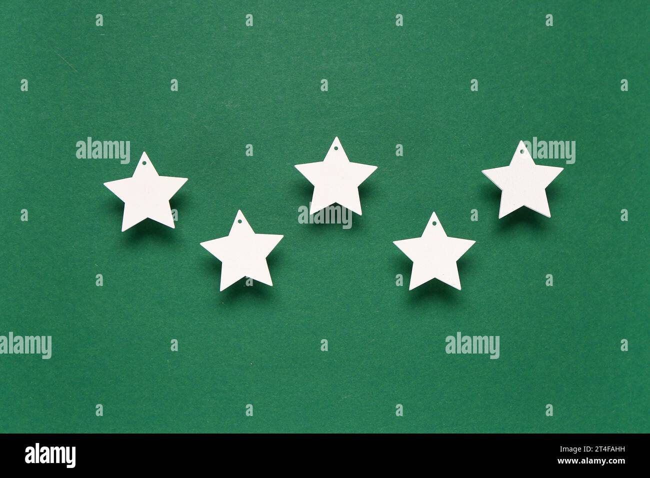 Five stars rating on green background. Customer experience concept ...