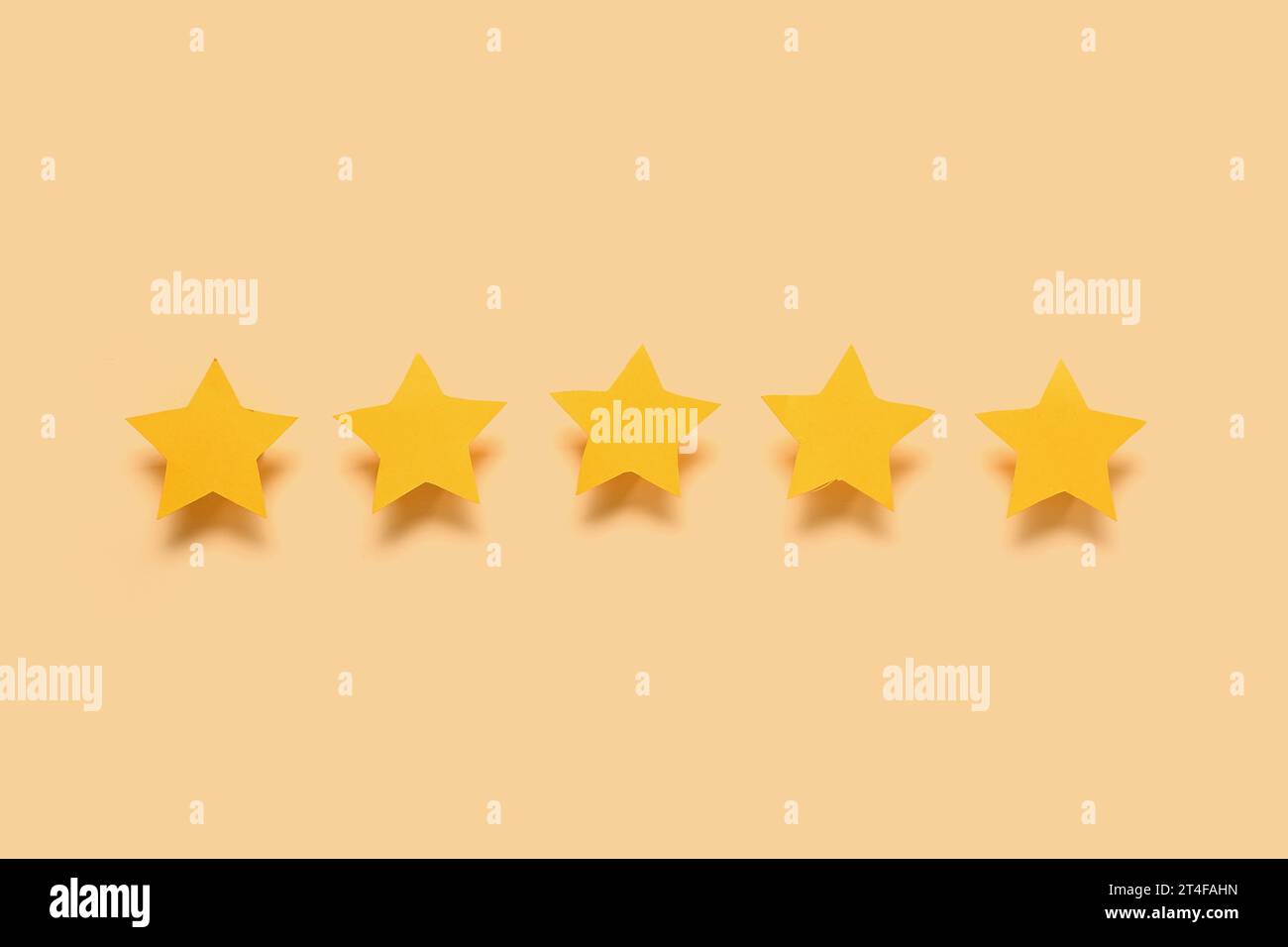 Five stars rating on yellow background. Customer experience concept ...