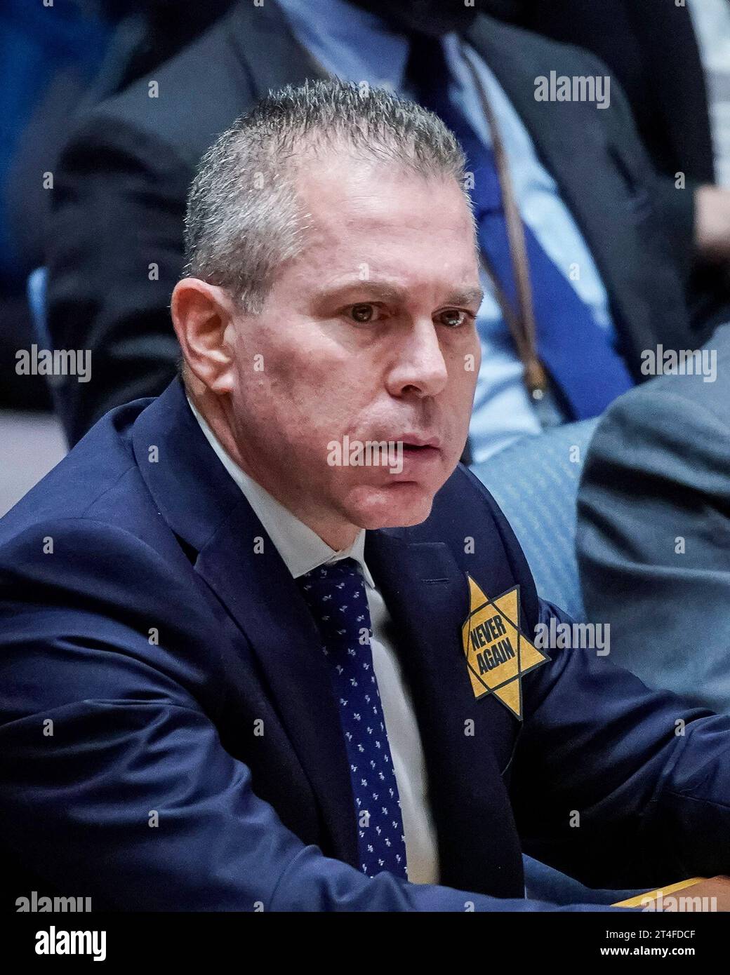 Israel’s U.N. Ambassador Gilad Erdan wears a yellow Star of David that ...