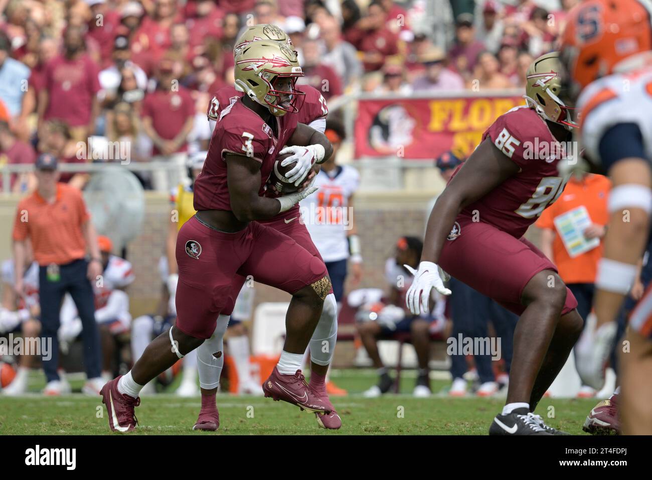 Florida State running back Trey Benson (3) rushes for yardage after ...