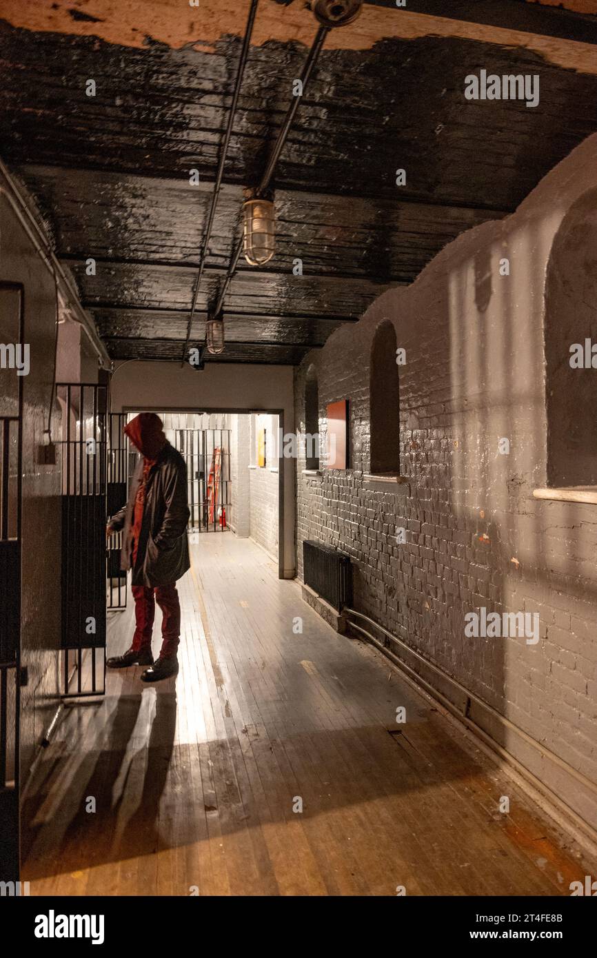 A person observes one of the cells at the Ottawa Jail. Ottawa, Ontario ...