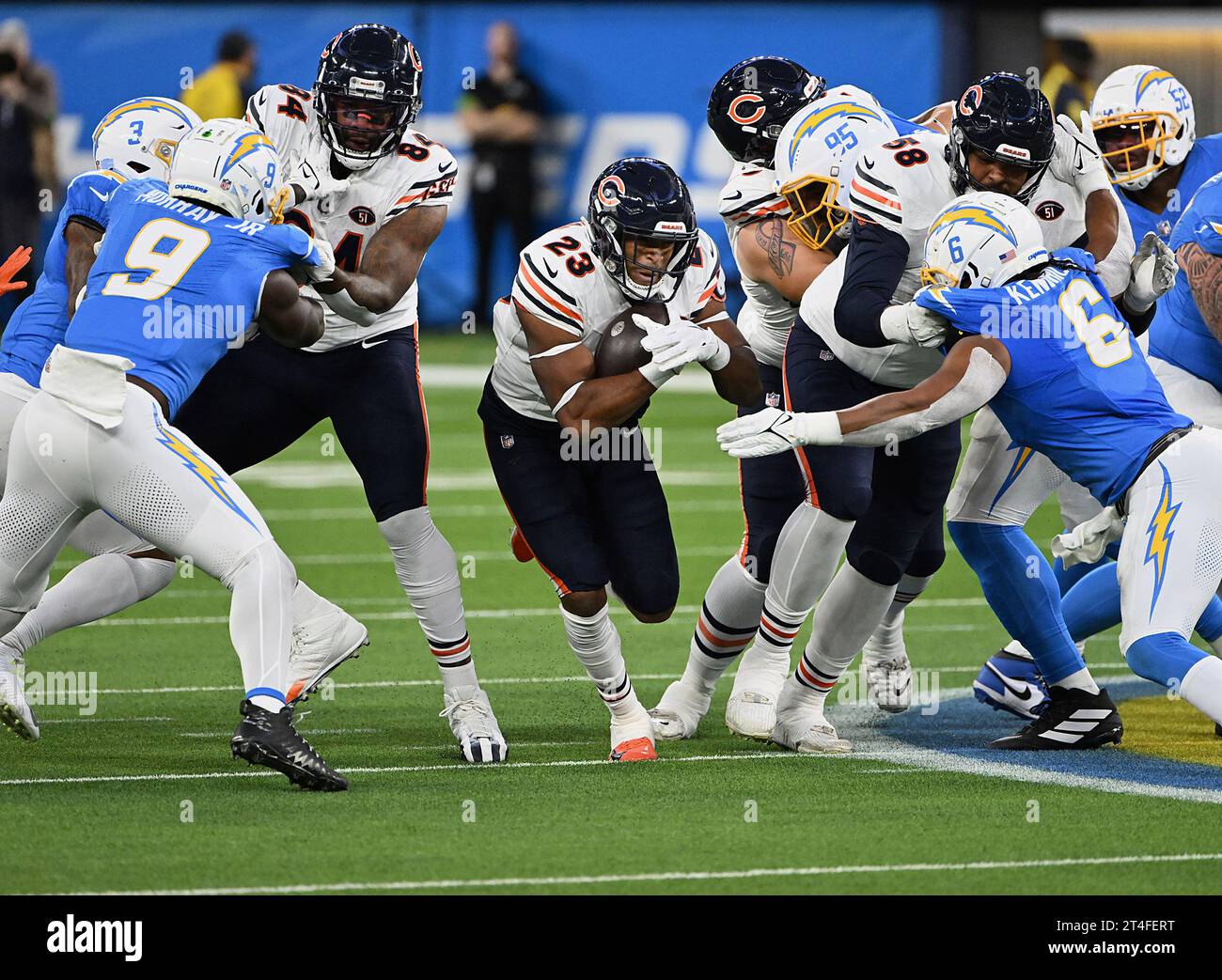 Chicago Bears running back Roschon Johnson (23) finds a hole in the ...