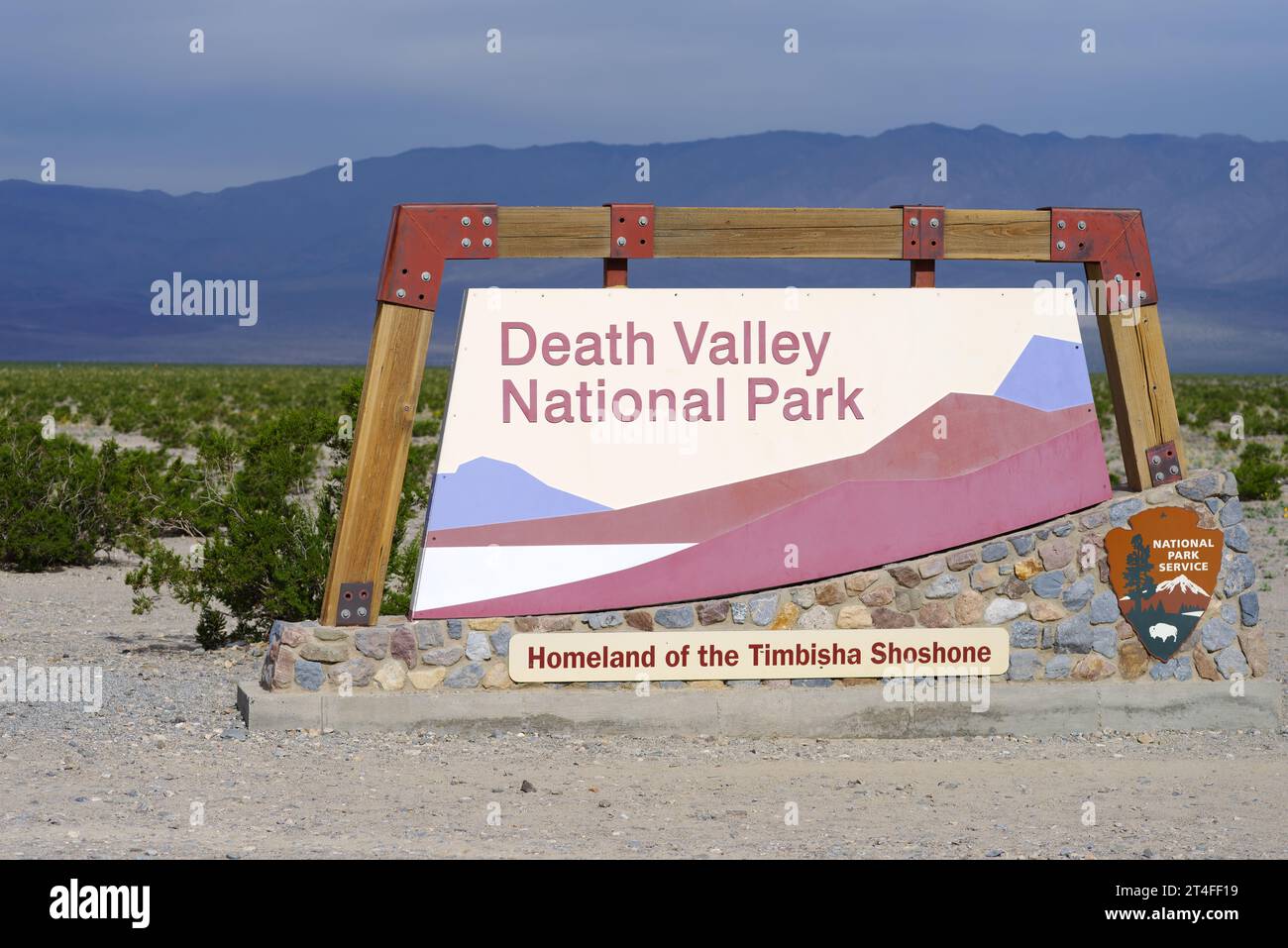 Entrance sign, park boundary gate, shown in Death Valley National Park ...