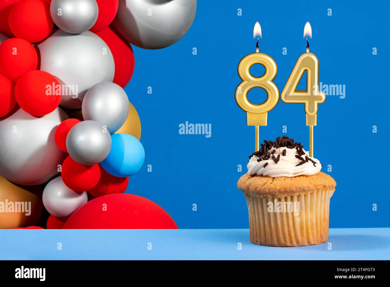 Birthday card with balloons - Candle number 84 Stock Photo - Alamy