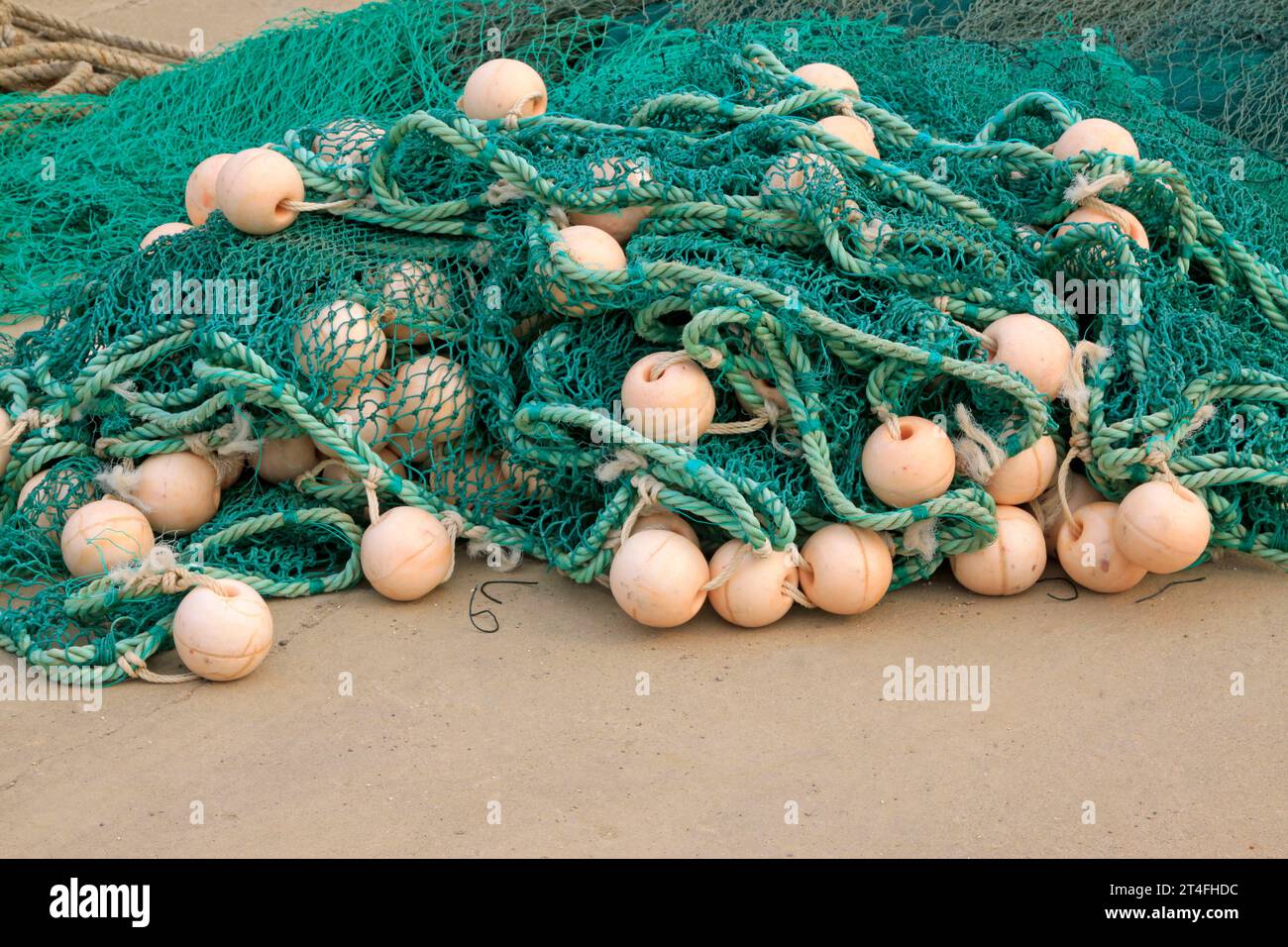 Nylon fishing nets and floats, closeup of photo Stock Photo - Alamy