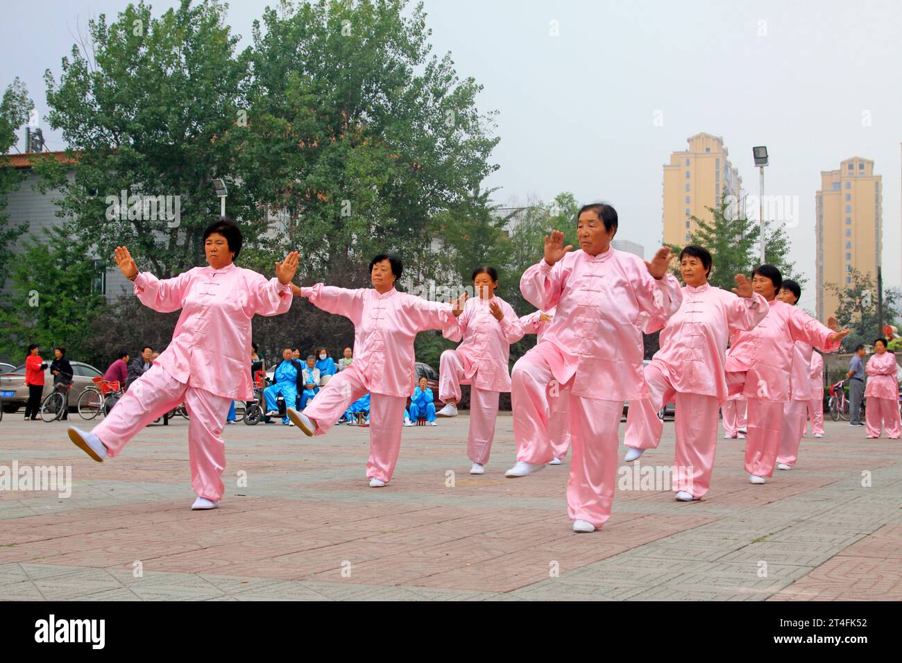 LUANNAN COUNTY - SEPTEMBER 20: Old women boxing performance in a square ...