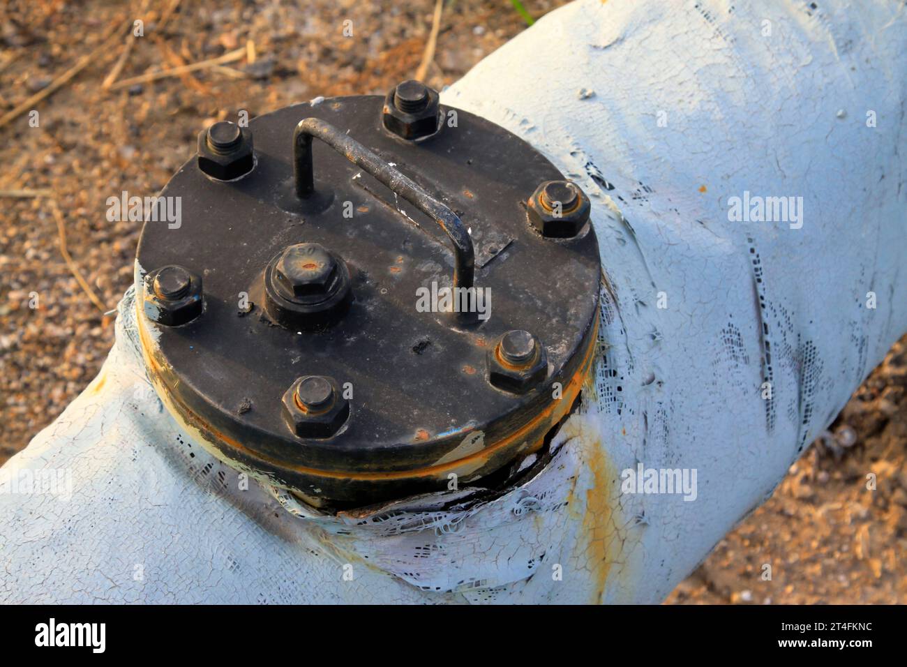 metal device on the pipeline, closeup of photo Stock Photo - Alamy