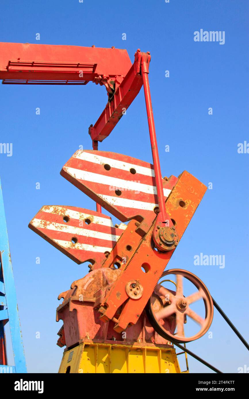 Balance parts of beam pumping unit, closeup of photo Stock Photo - Alamy