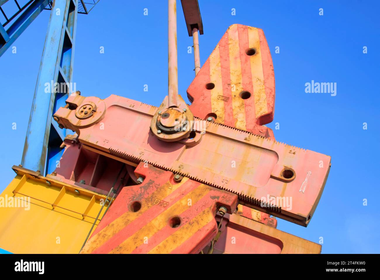 Balance parts of beam pumping unit, closeup of photo Stock Photo - Alamy