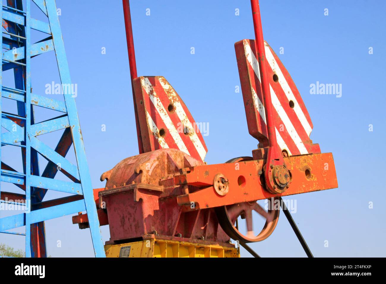 Balance parts of beam pumping unit, closeup of photo Stock Photo - Alamy