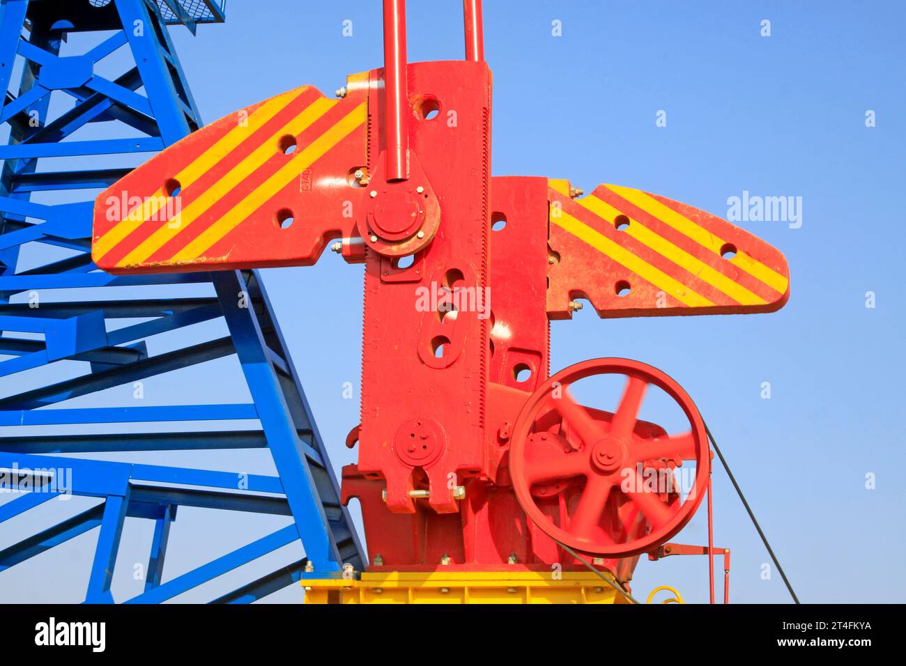 Balance parts of beam pumping unit, closeup of photo Stock Photo - Alamy