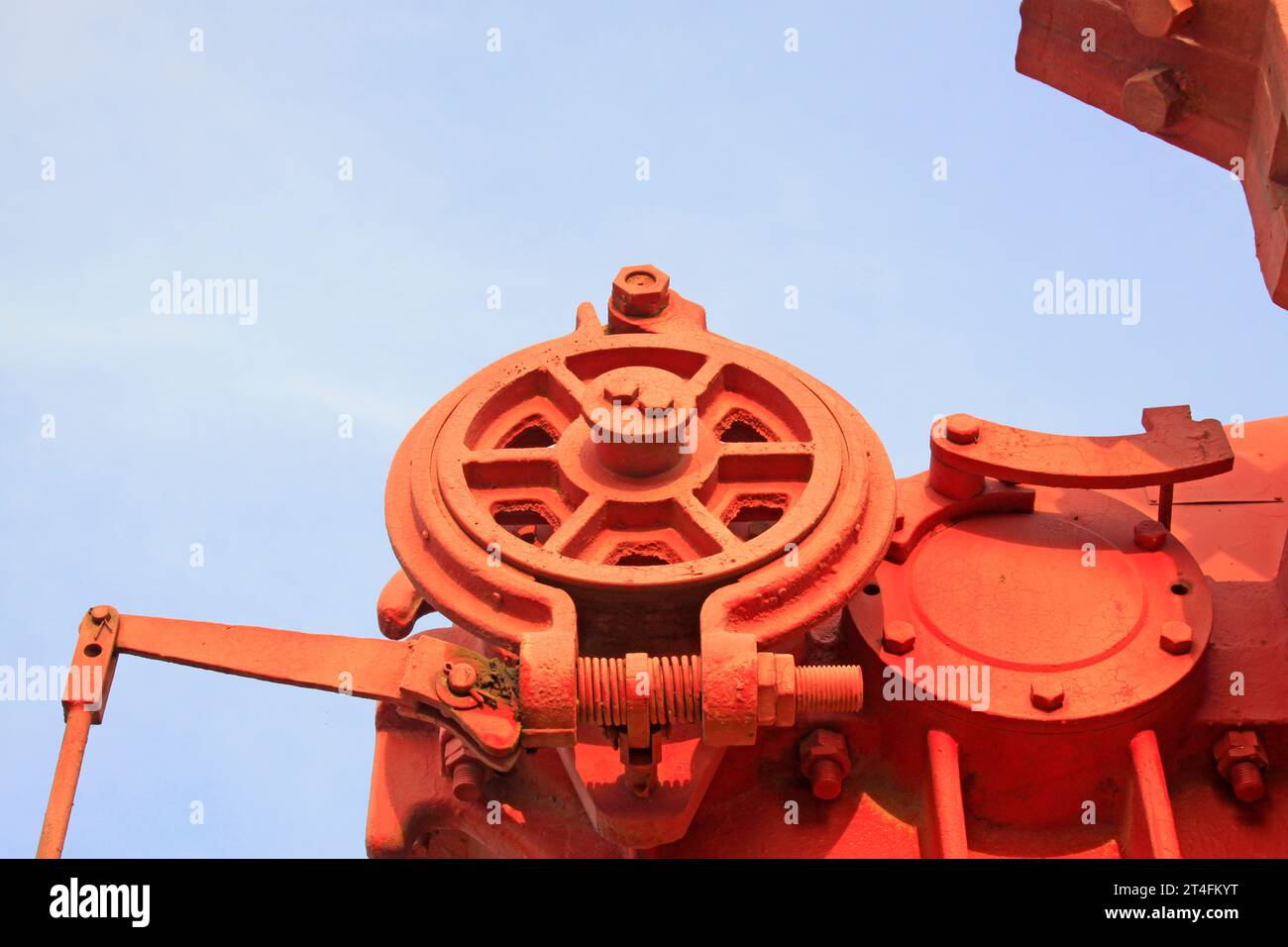 Beam pumping unit crank pulley, closeup of photo Stock Photo - Alamy