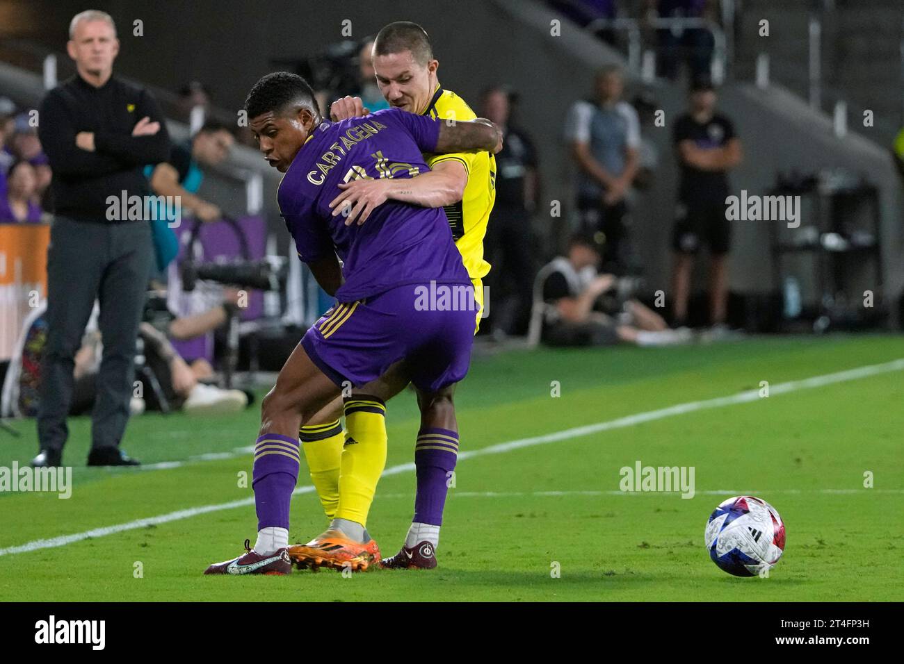 Orlando City midfielder Wilder Cartagena, left, and Nashville SC ...