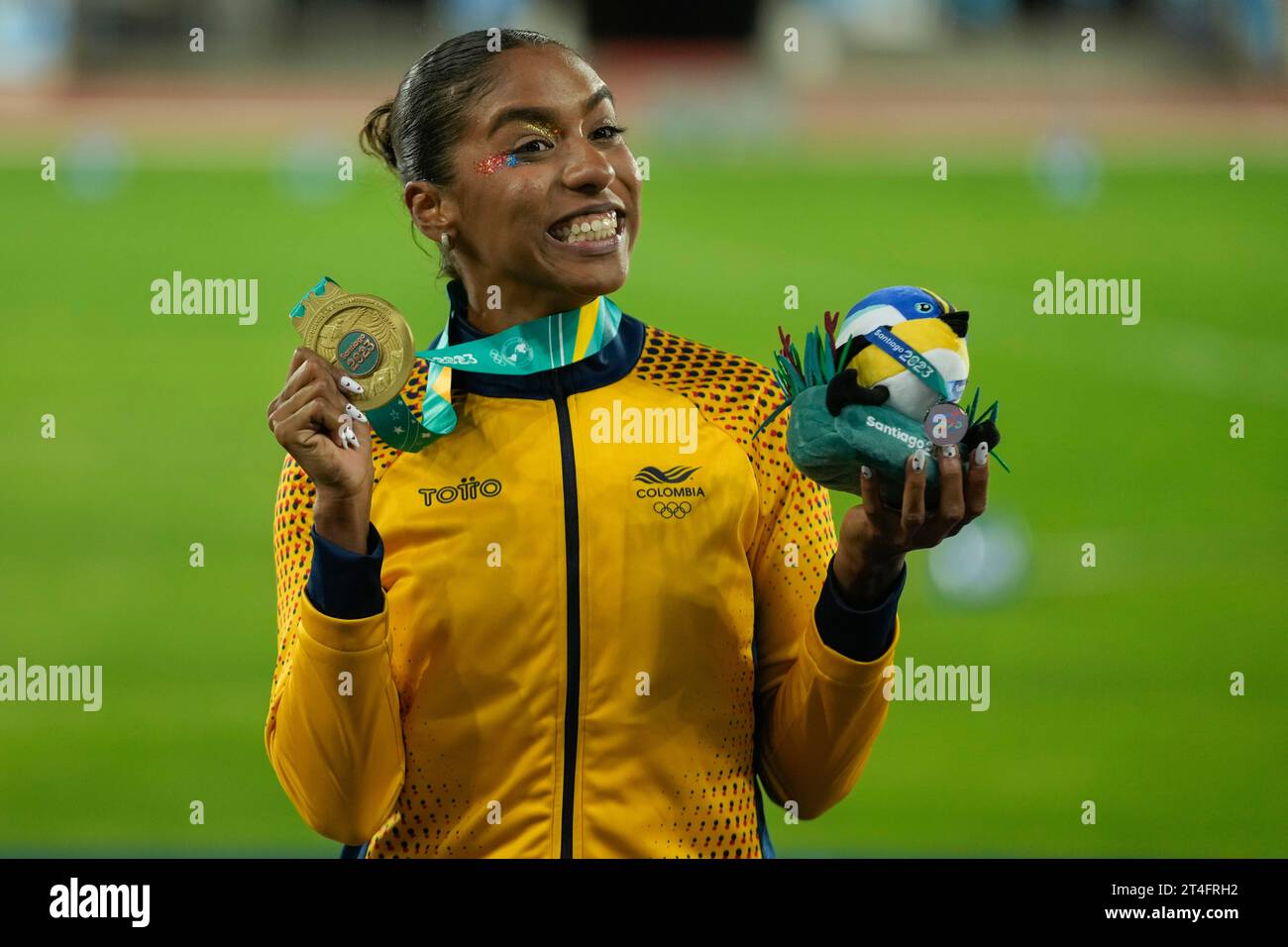 Colombia's Natalia Linares poses with her gold medal on the podium of ...