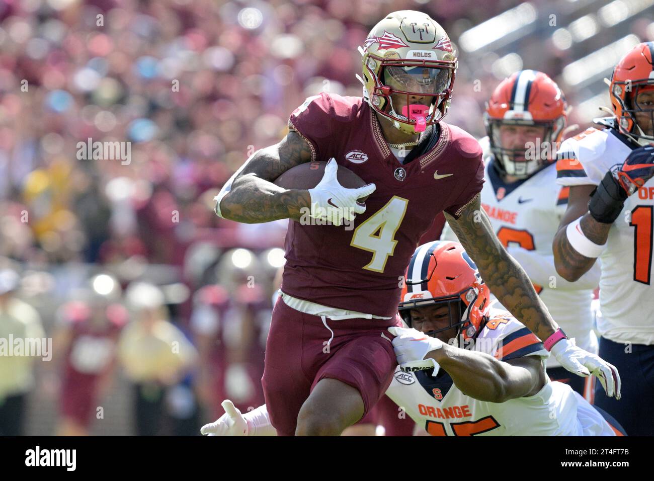 Florida State wide receiver Keon Coleman (4) runs on a punt return ...