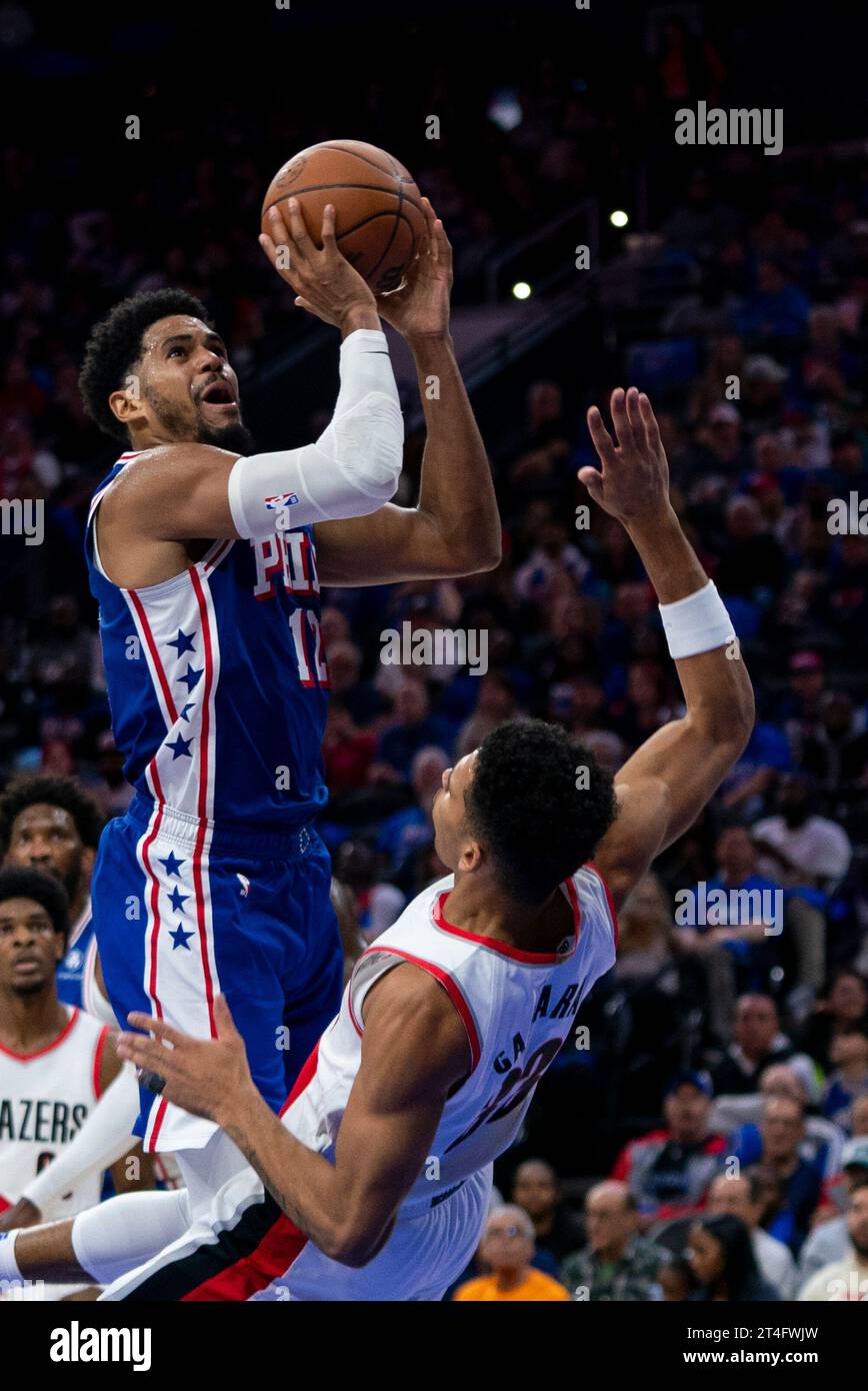 Philadelphia 76ers' Tobias Harris, left, in action against Portland ...