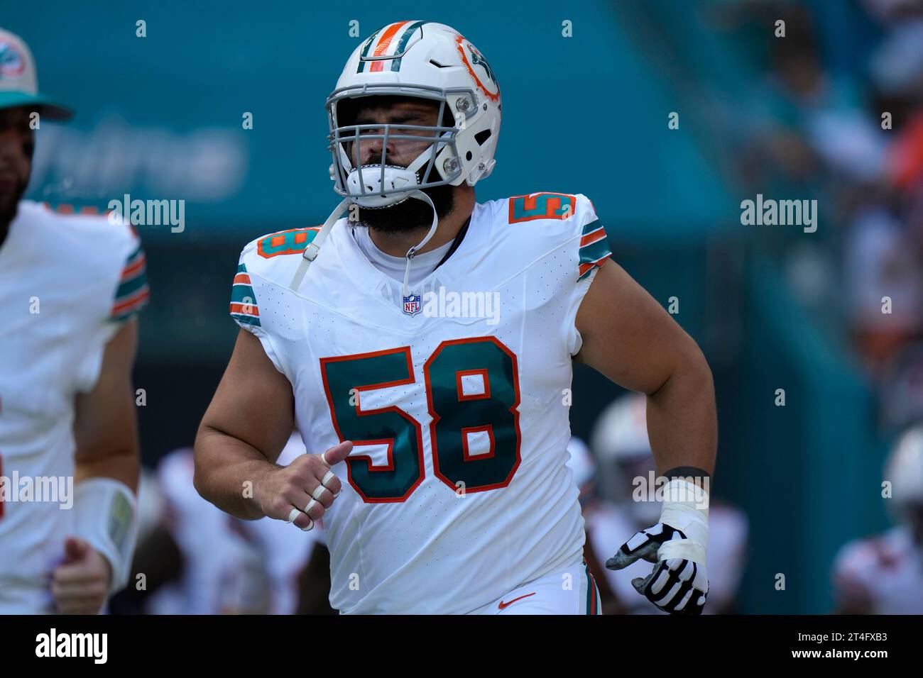 Miami Dolphins guard Connor Williams (58) heads out onto the field ...