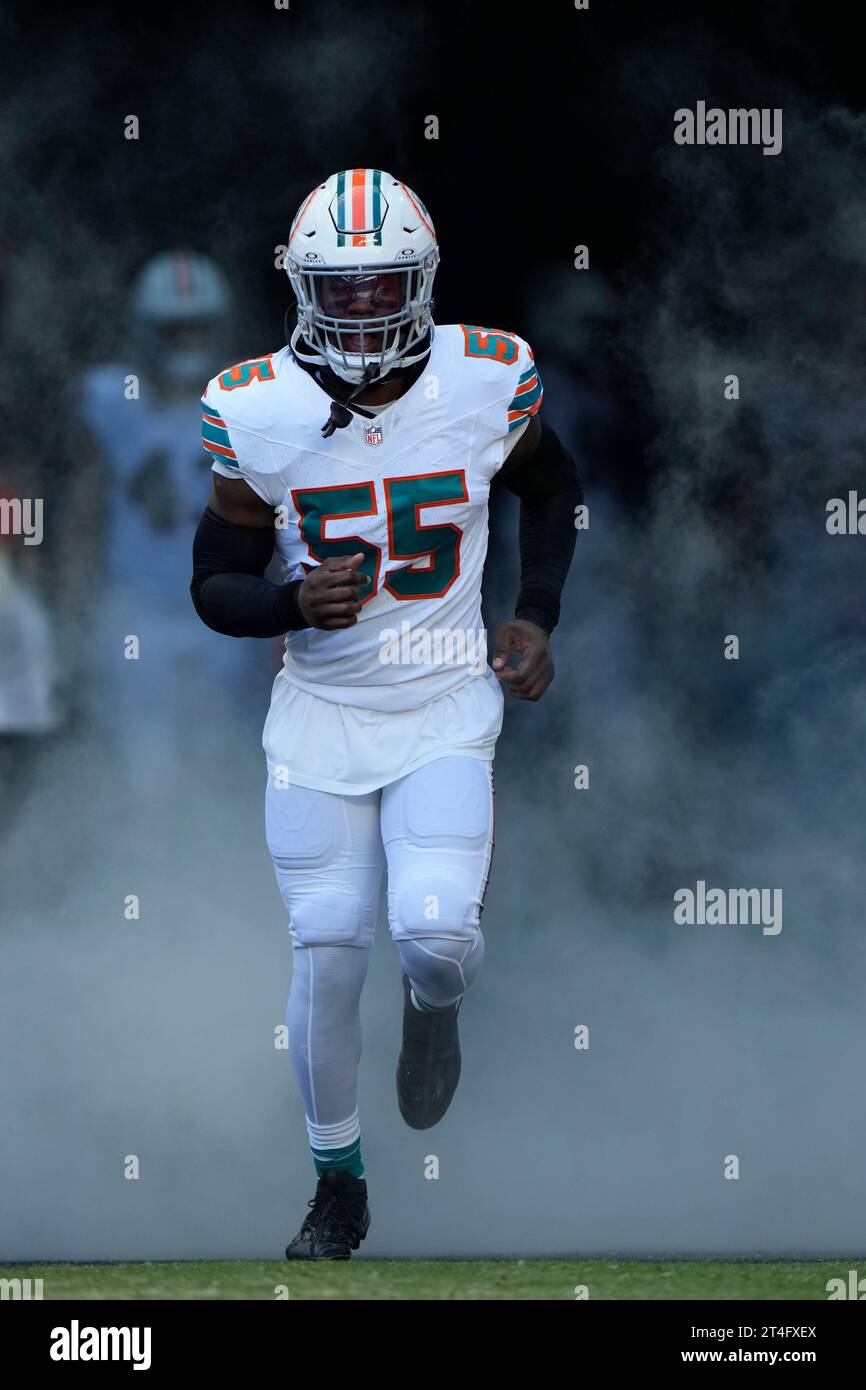 Miami Dolphins linebacker Jerome Baker (55) heads out onto the field ...