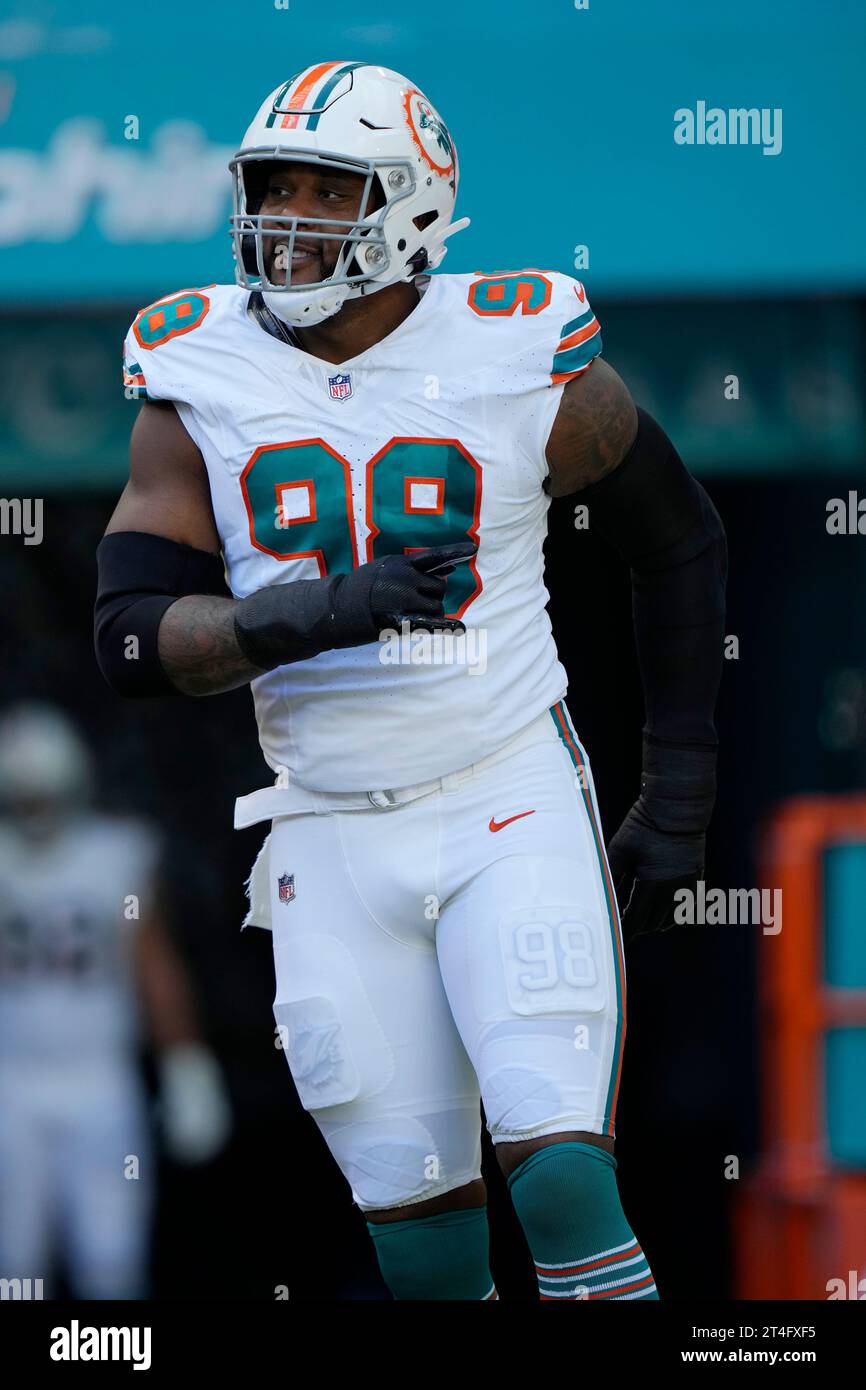 Miami Dolphins defensive tackle Raekwon Davis heads out onto the field ...