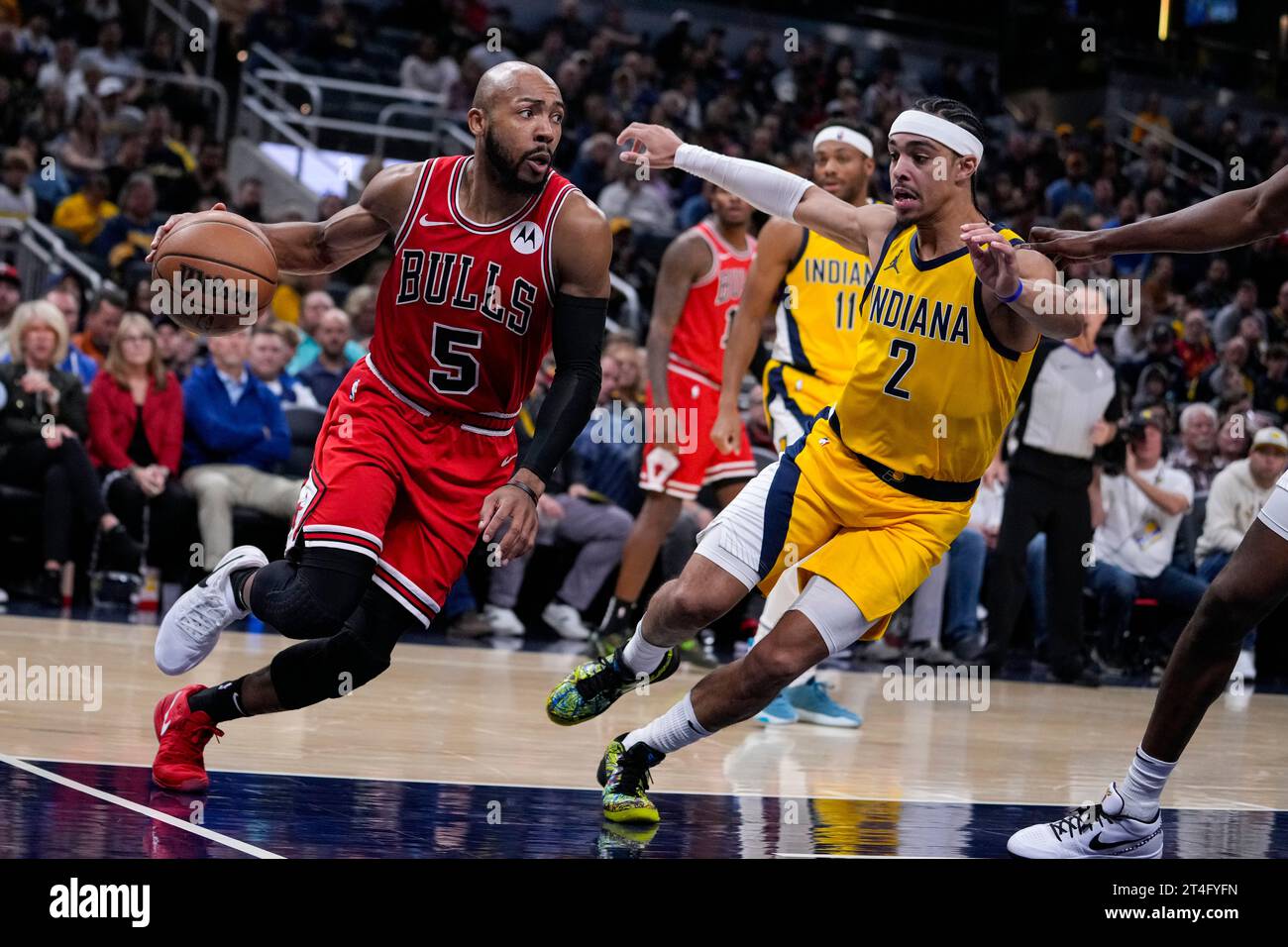 Chicago Bulls guard Jevon Carter (5) drives on Indiana Pacers guard ...