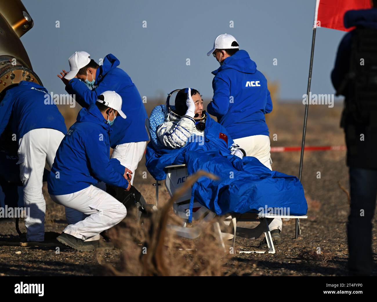 Dongfeng Landing Site. 31st Oct, 2023. Astronaut Jing Haipeng is out of the return capsule of ...