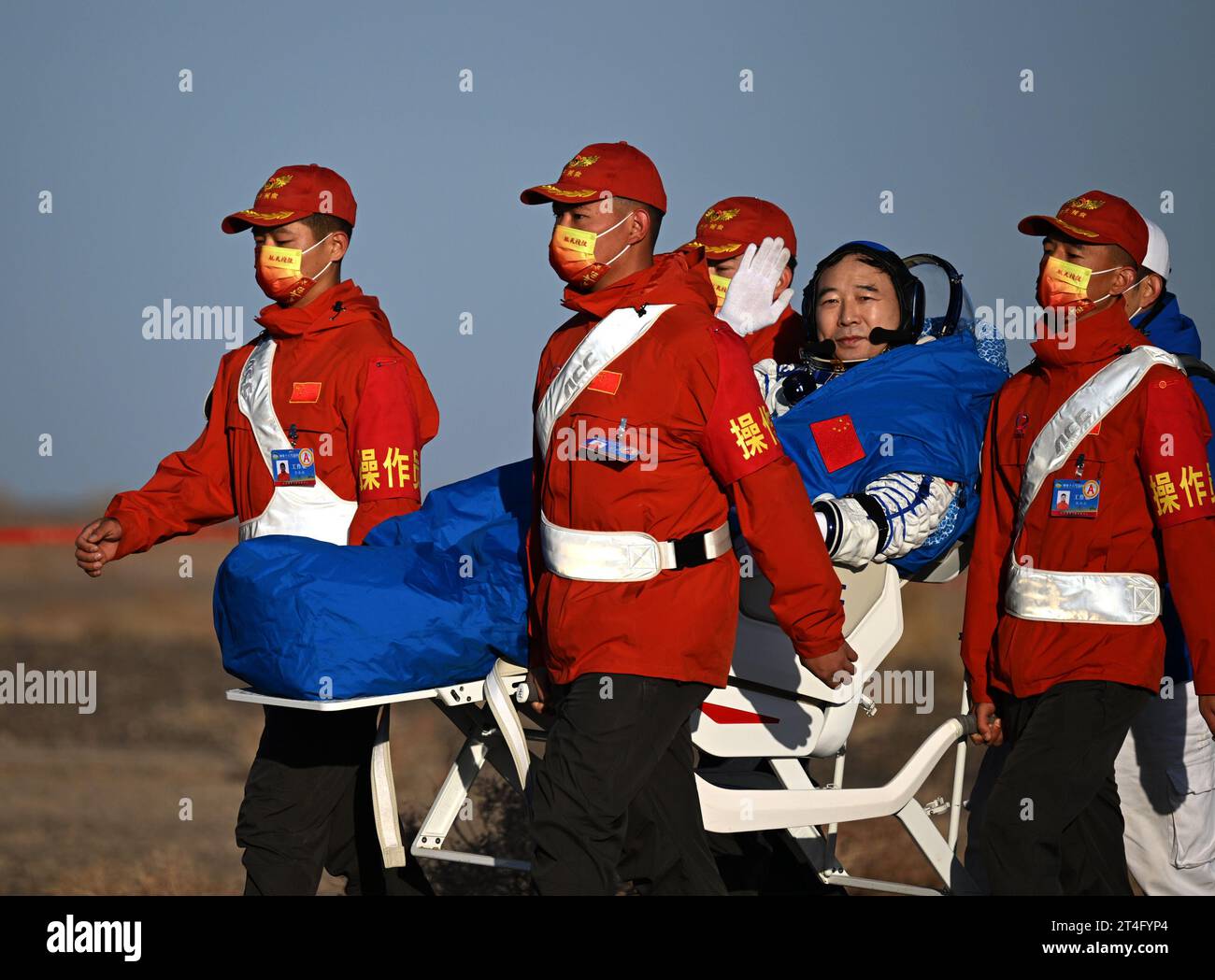 Dongfeng Landing Site. 31st Oct, 2023. Astronaut Jing Haipeng is out of the return capsule of ...