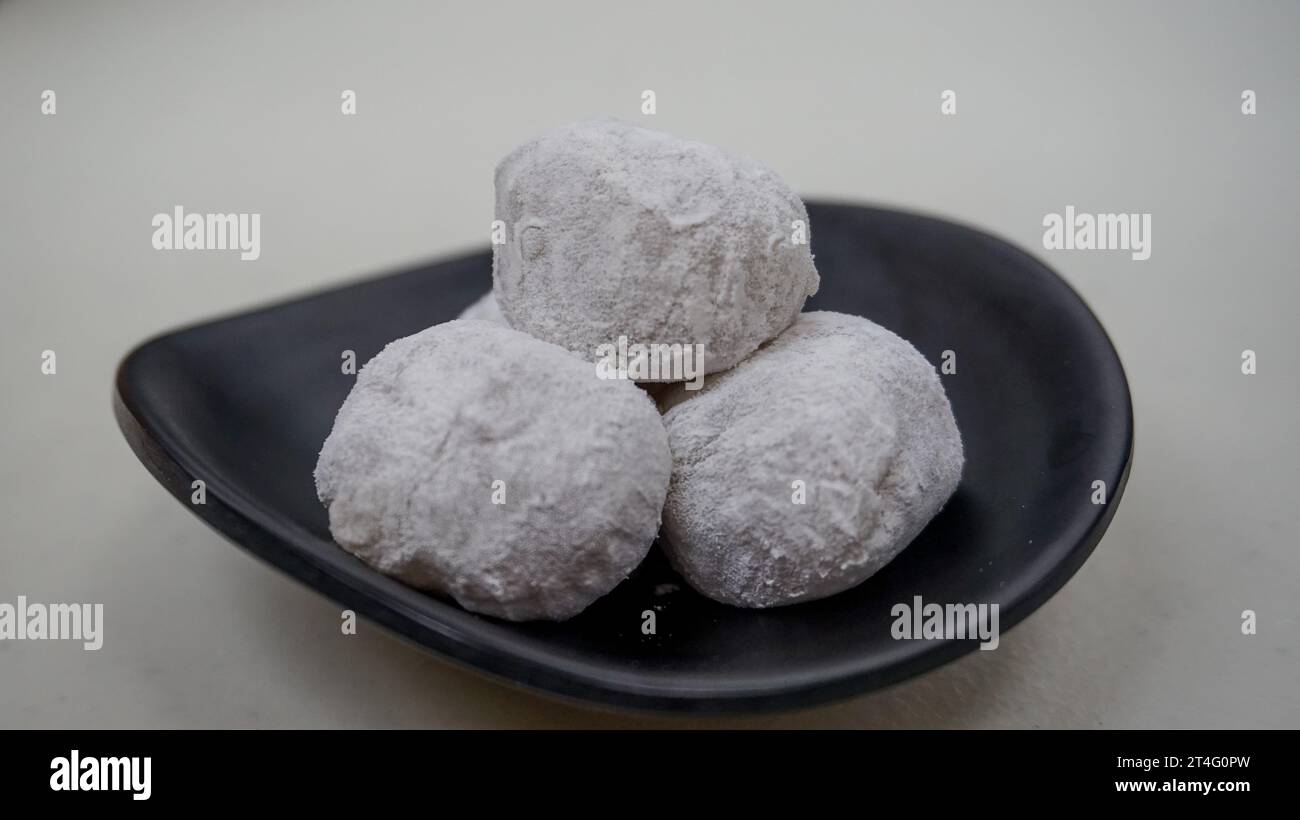 moci or mochi is a food made from sticky rice flour in a round shape ...