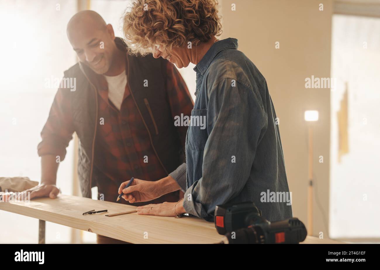 Woman working on a diy project at home hi-res stock photography and ...